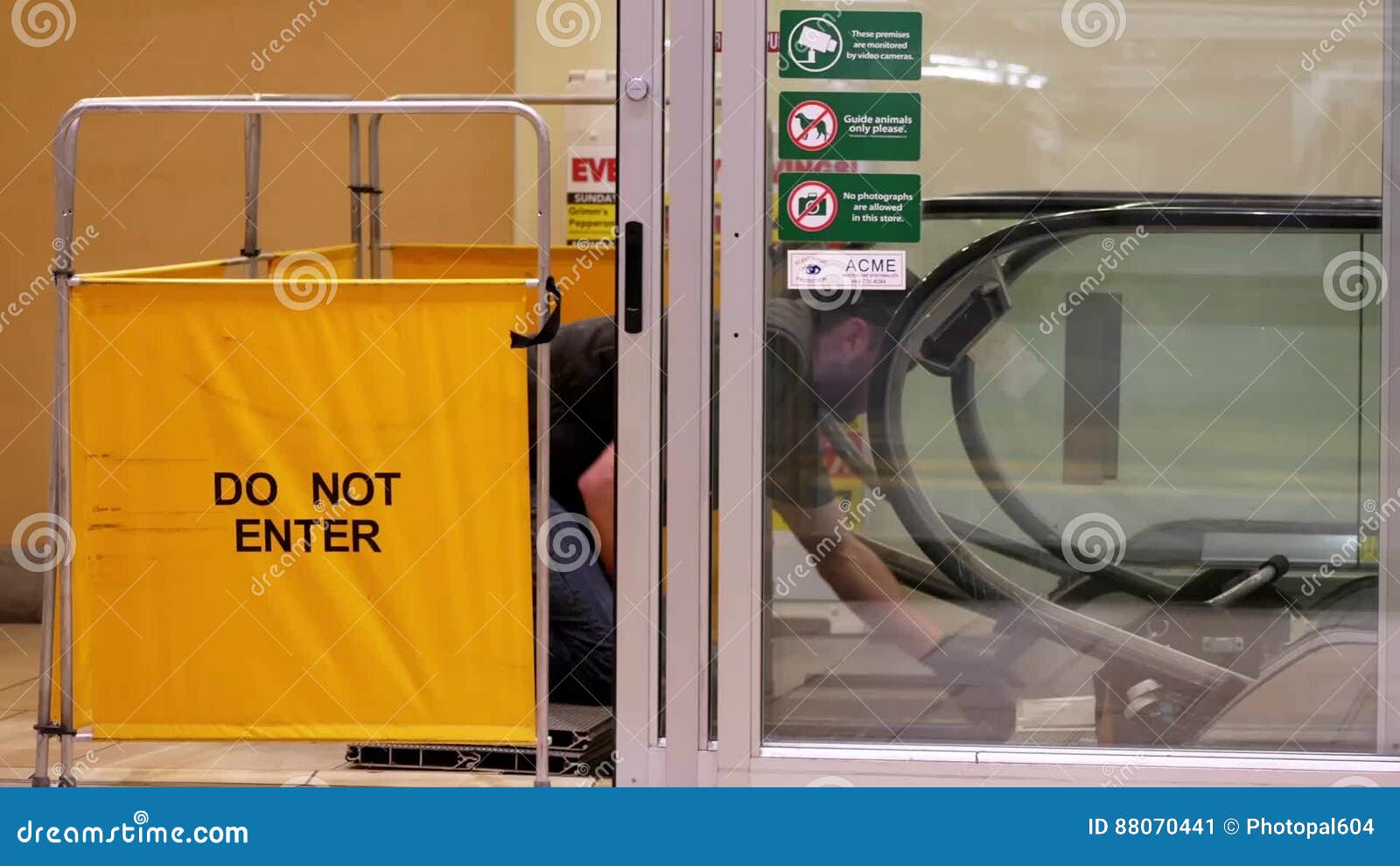 Motion of Worker Shut Down Escalator for Maintenance with Do Not Enter ...
