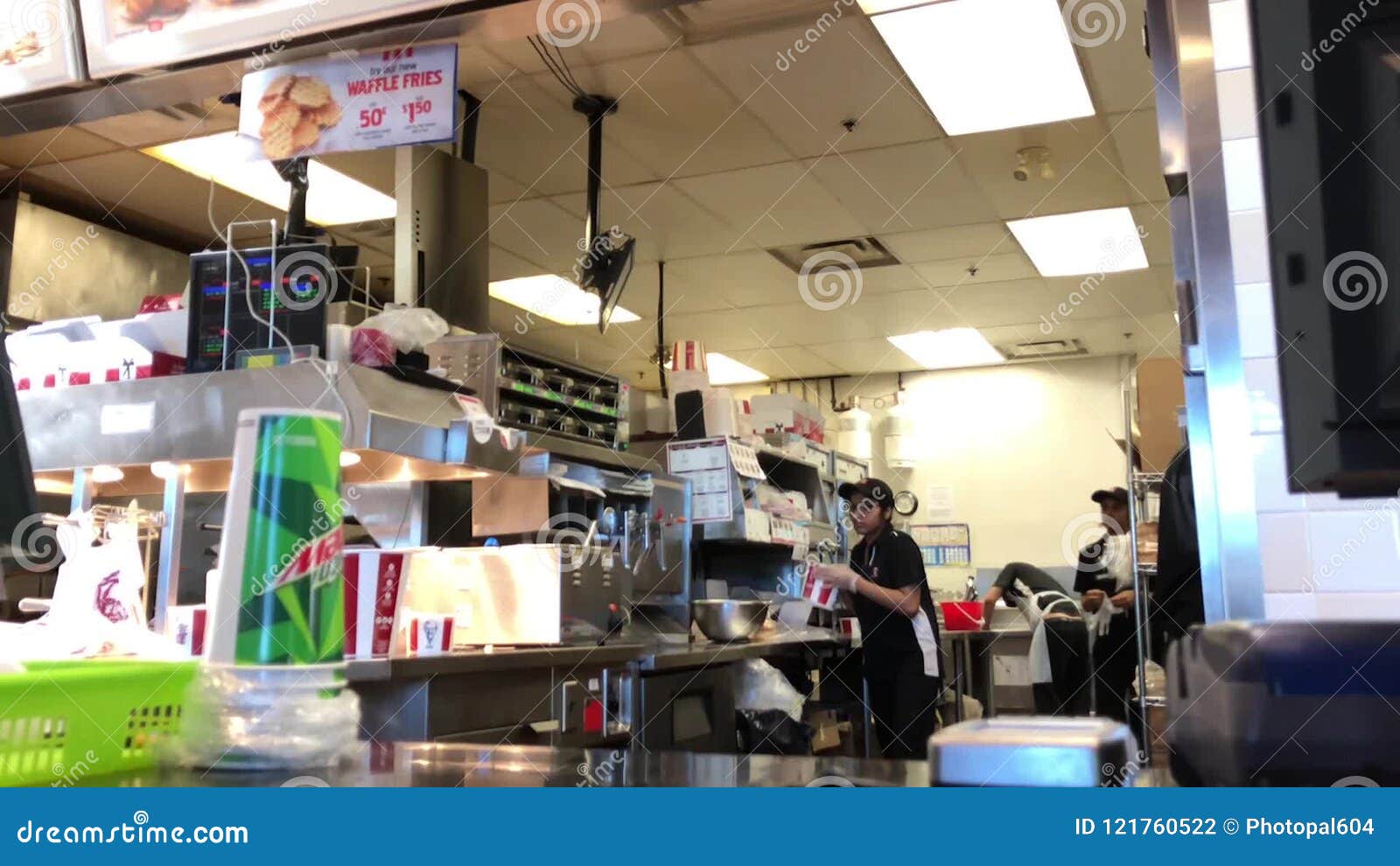 Motion of Worker Taking Order at Counter Inside KFC Restaurant Stock ...