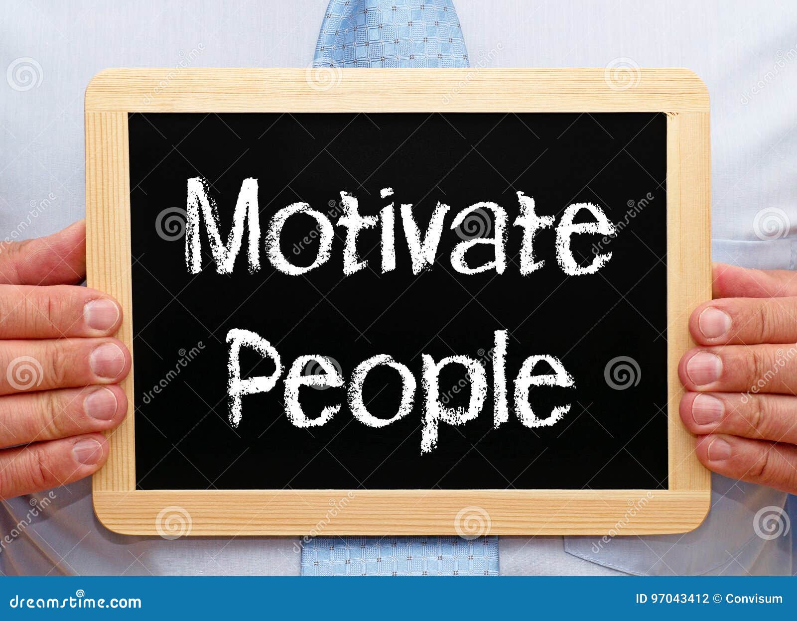 Motivate People - Businessman Holding Chalkboard with Text Stock Photo ... Motivate People - Businessman Holding Chalkboard with Text Stock Photo ...