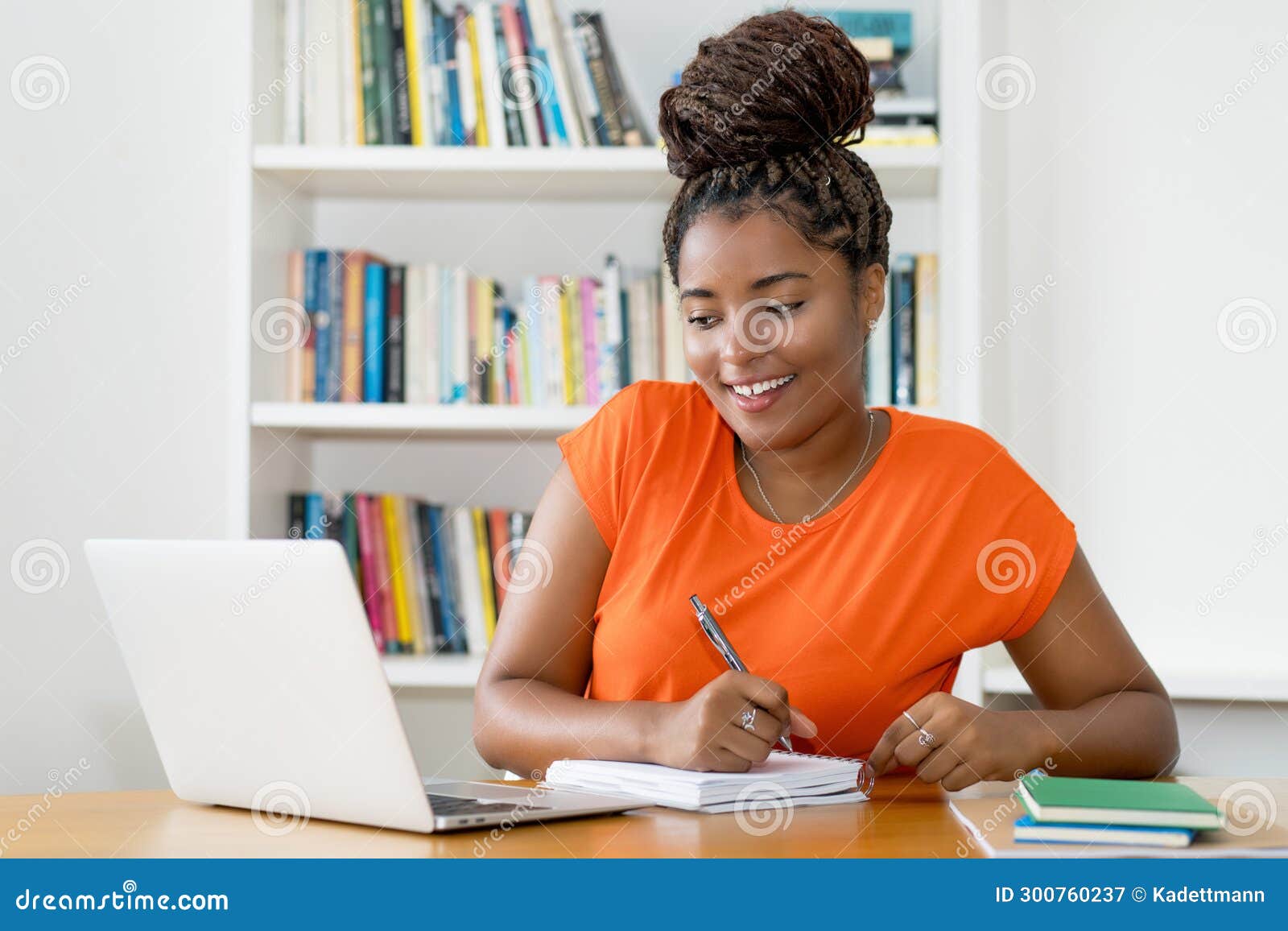 Motivated and Laughing Black Female Student Learning for Graduation ...