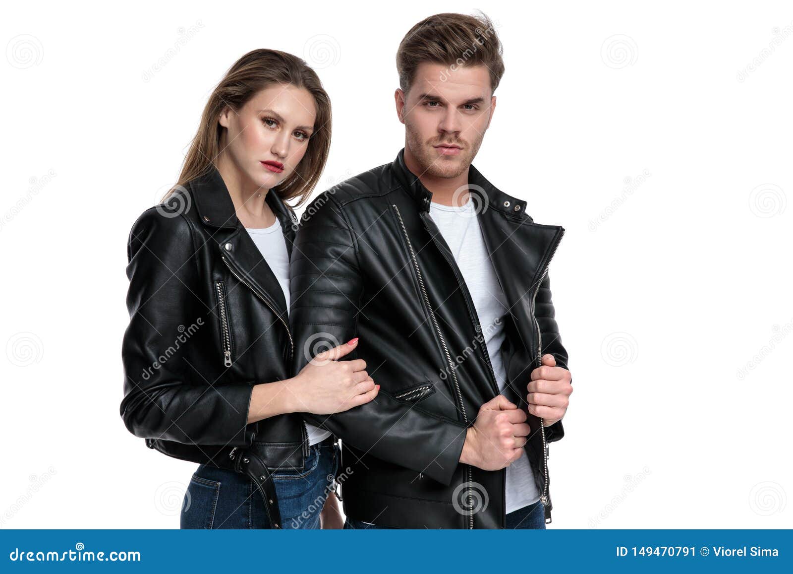Motivated Young Man Pulling His Jacket,being Embraced by Girlfriend ...
