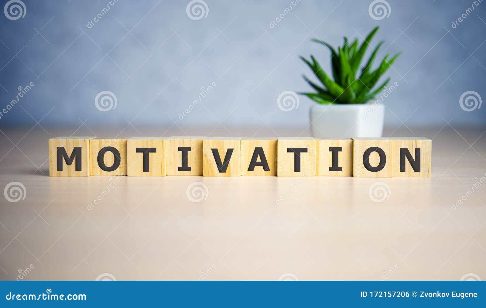 Motivation Words MOTIVATION Made from Wooden Cubes. Blue Background ...