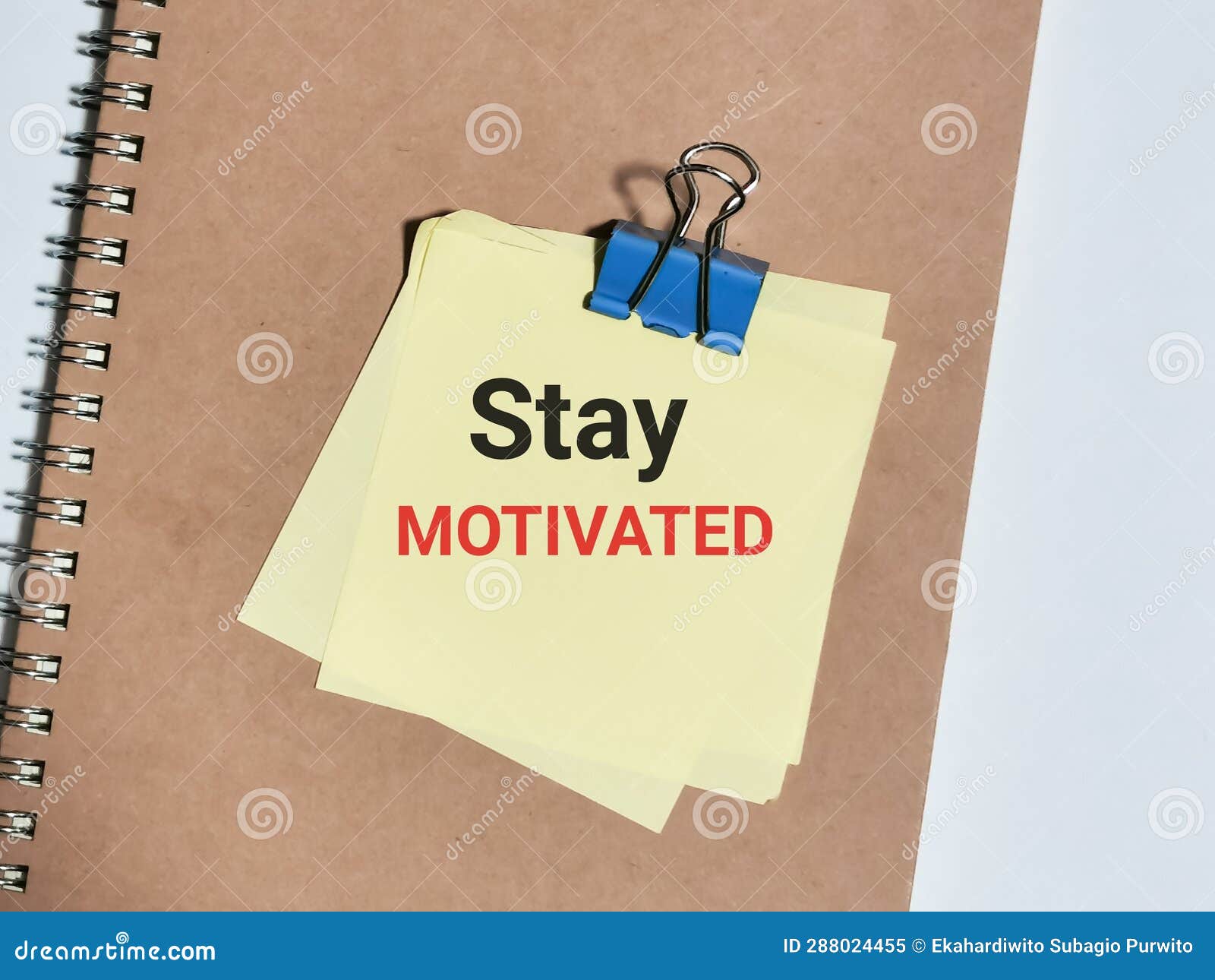 Motivation Words. Text Stay Motivated Written on Notepad with a Note ...