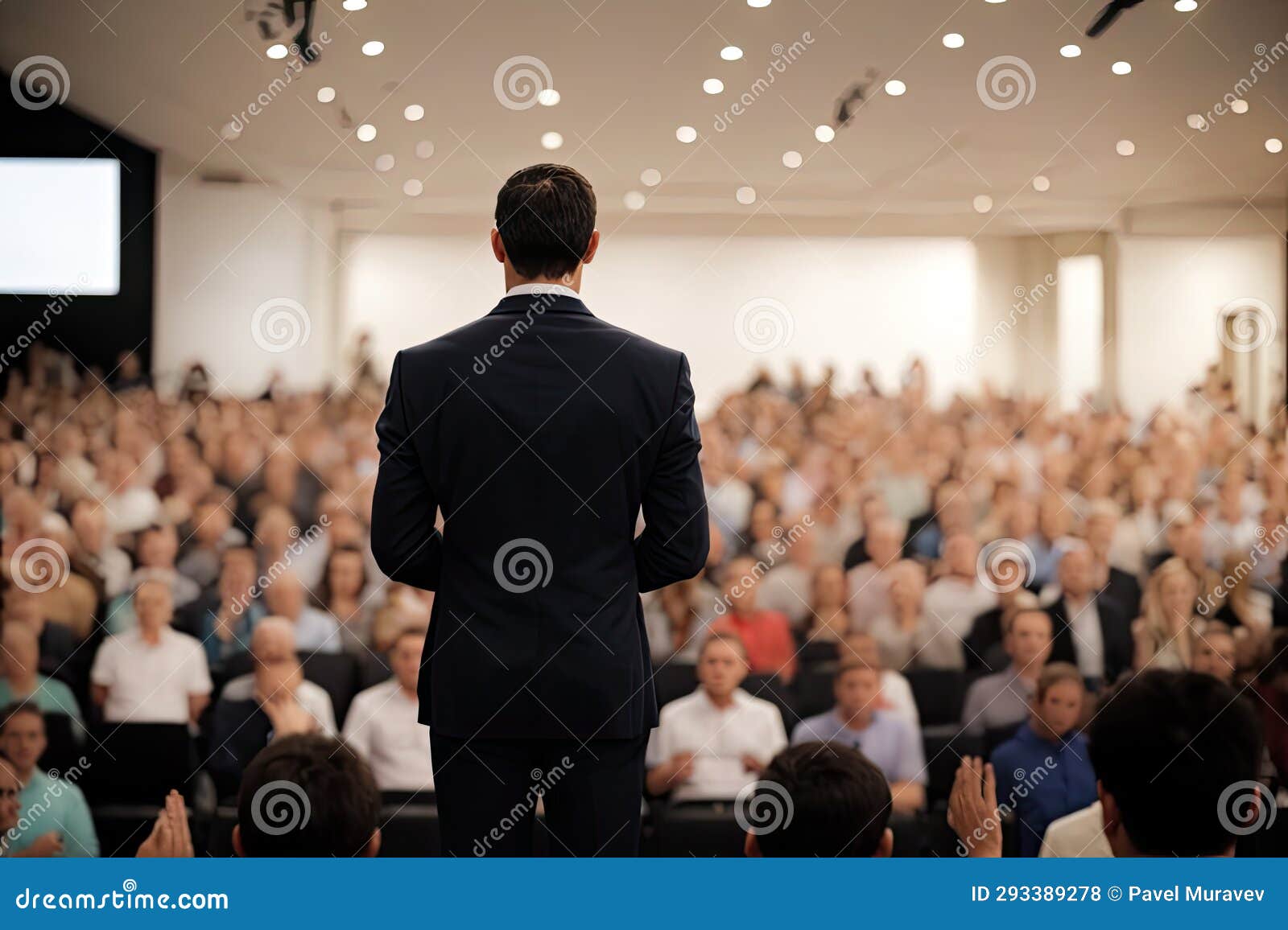 Motivational Speaker. Back View of Motivational Speaker Standing on ...