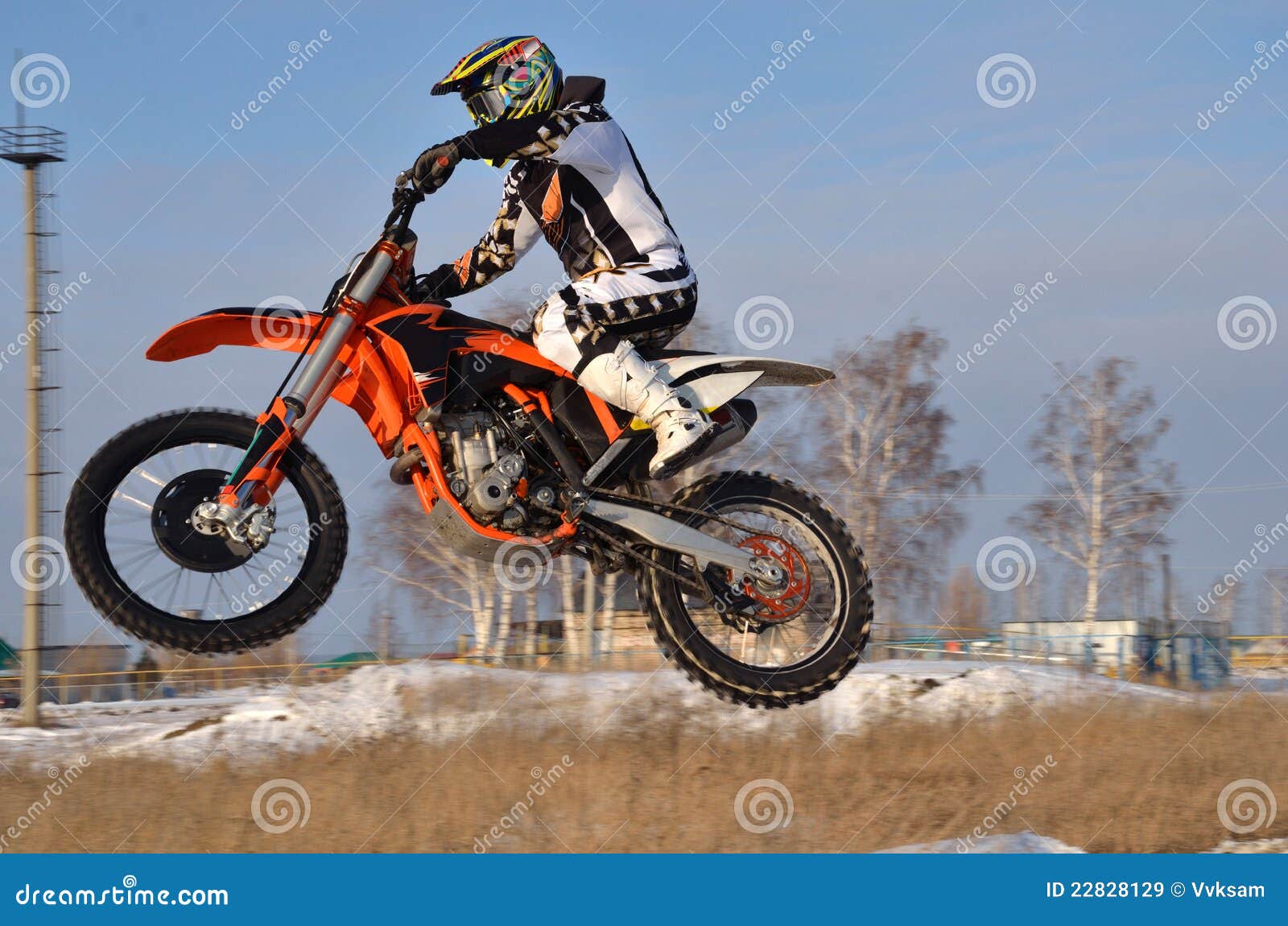 Motocross Driver Flies Over Hill Out of Snow Stock Image - Image of ...