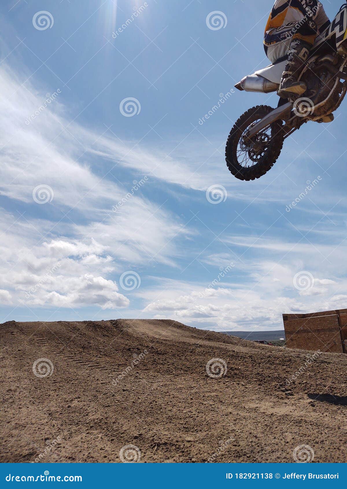 Motocross fly by stock photo. Image of airborne, copy - 182921138