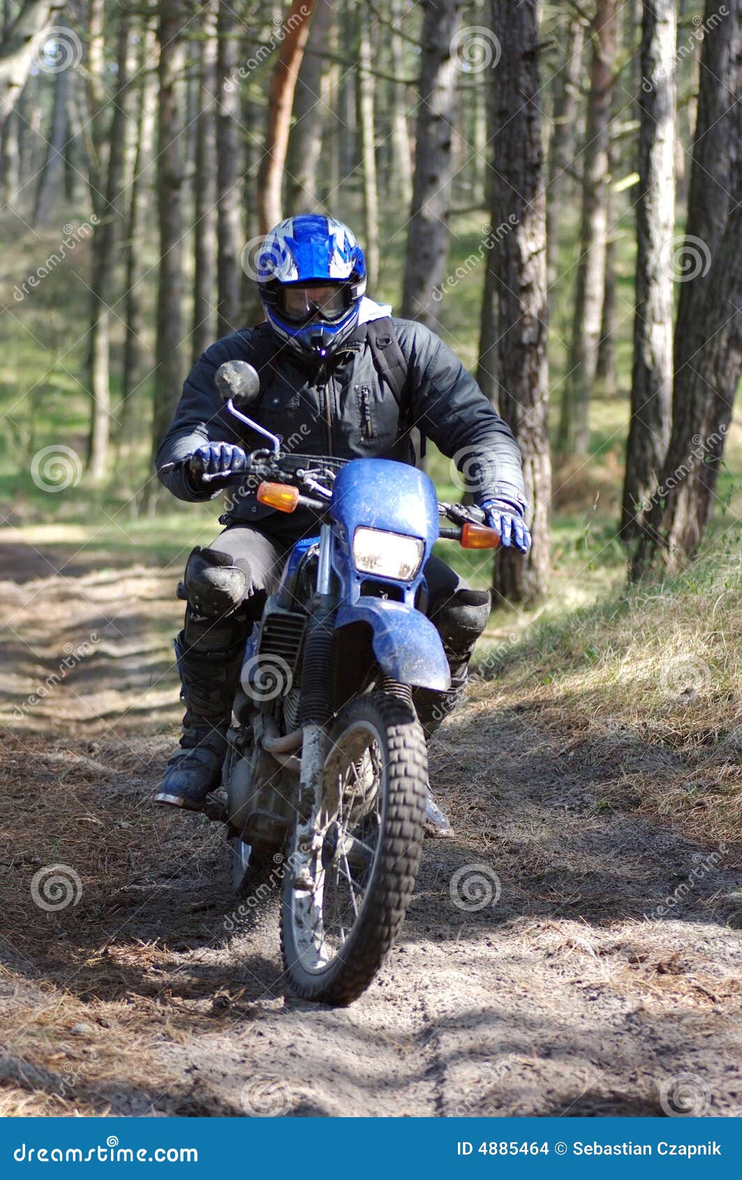 Motocross through forest stock photo. Image of motorbike - 4885464