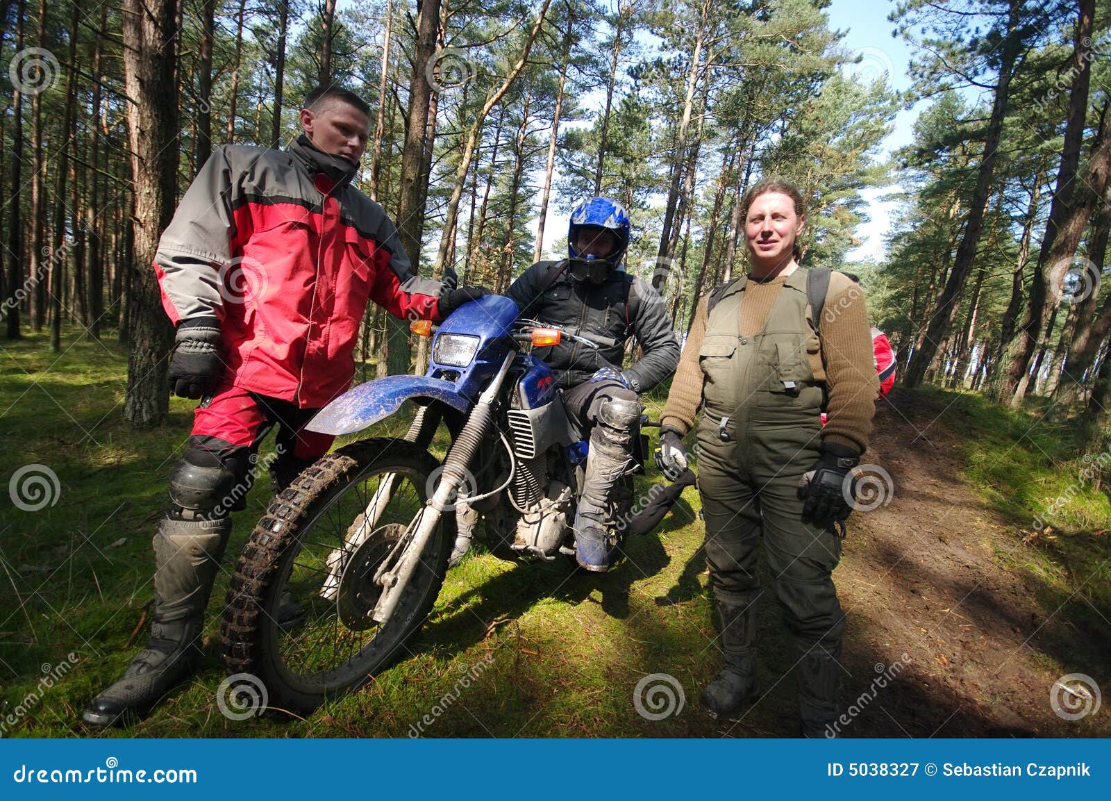 Motocross riders in forest stock image. Image of posing - 5038327
