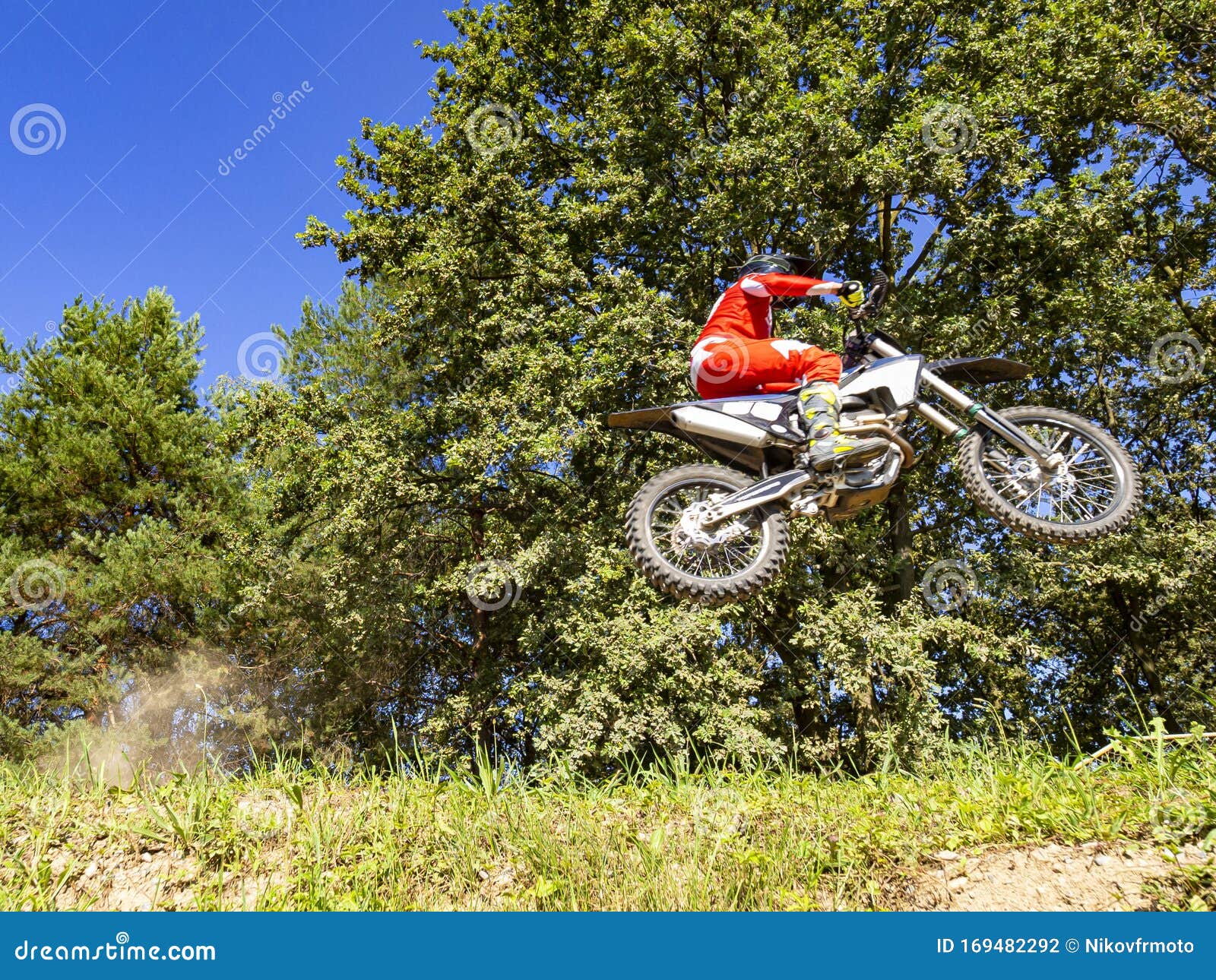 Motocross scene on a trail stock photo. Image of motorbike - 169482292
