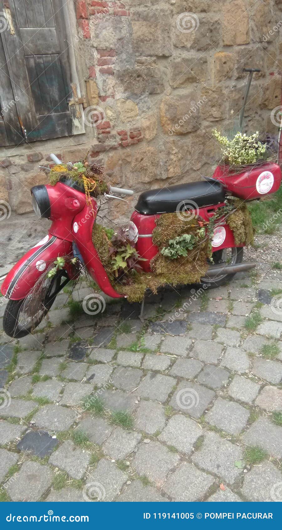 Motocycle with flowers stock image. Image of flowers - 119141005