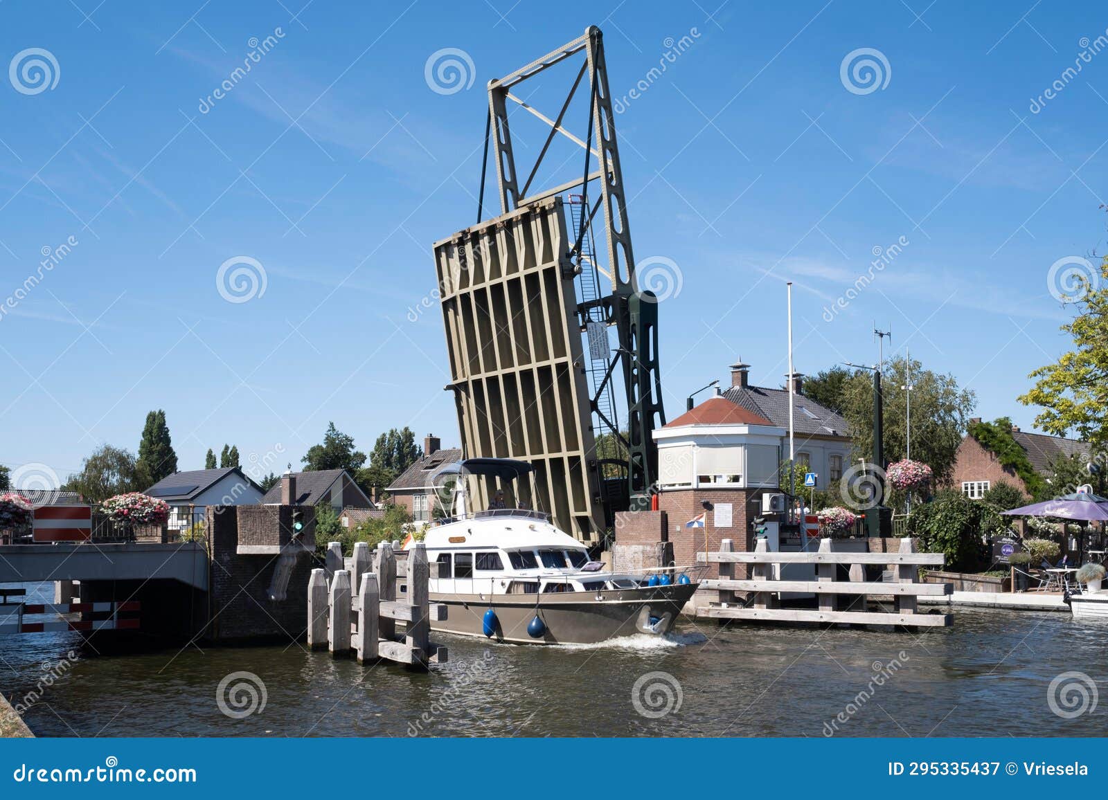Motor Boat Sails Under an Opened Steel Drawbridge in the Netherlands ...