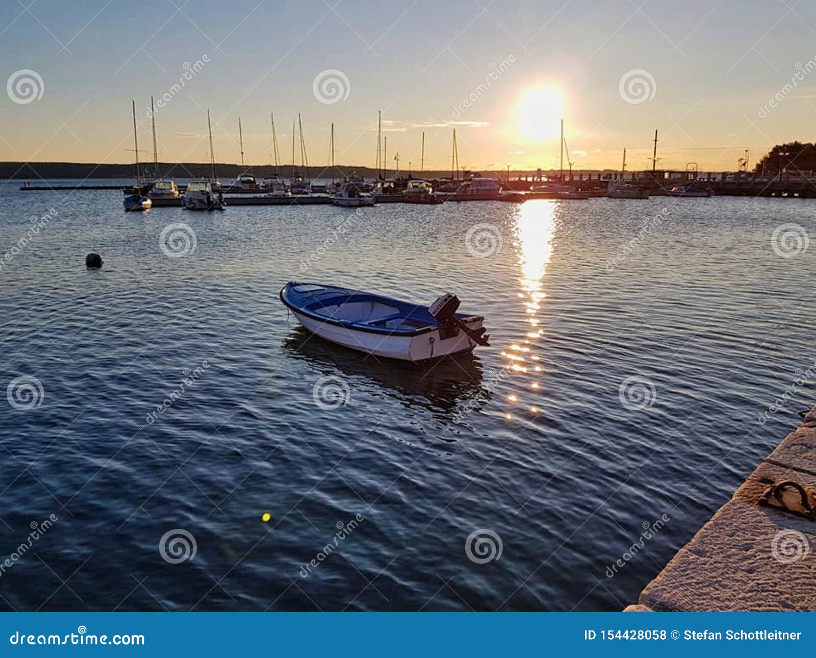 A Motor Boat in the Sea Sunset Stock Photo - Image of shore, blue ...