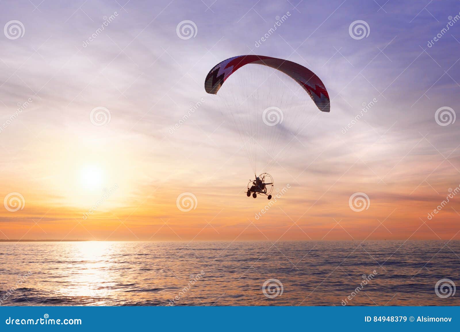 Motor Glider Flying Over the Sea during Sunset Stock Image - Image of ...