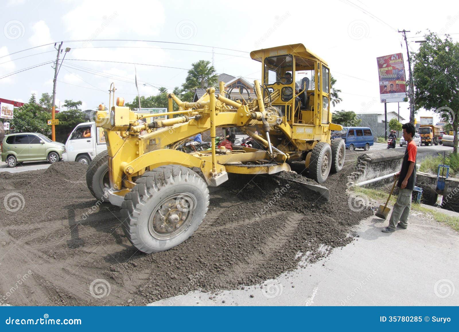 Motor Grader On Road Construction. Orange Bulldozer On Bridge Road ...