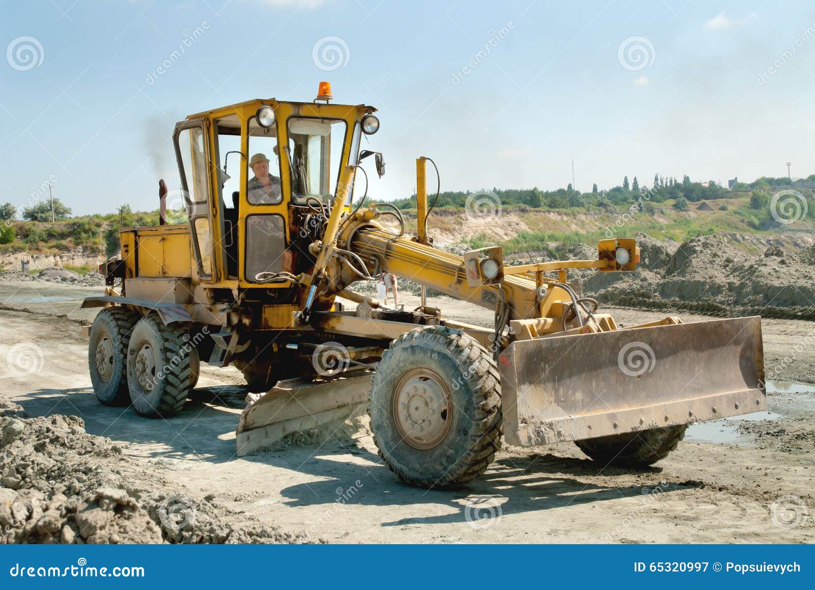 Motor grader work editorial photography. Image of excavation - 65320997