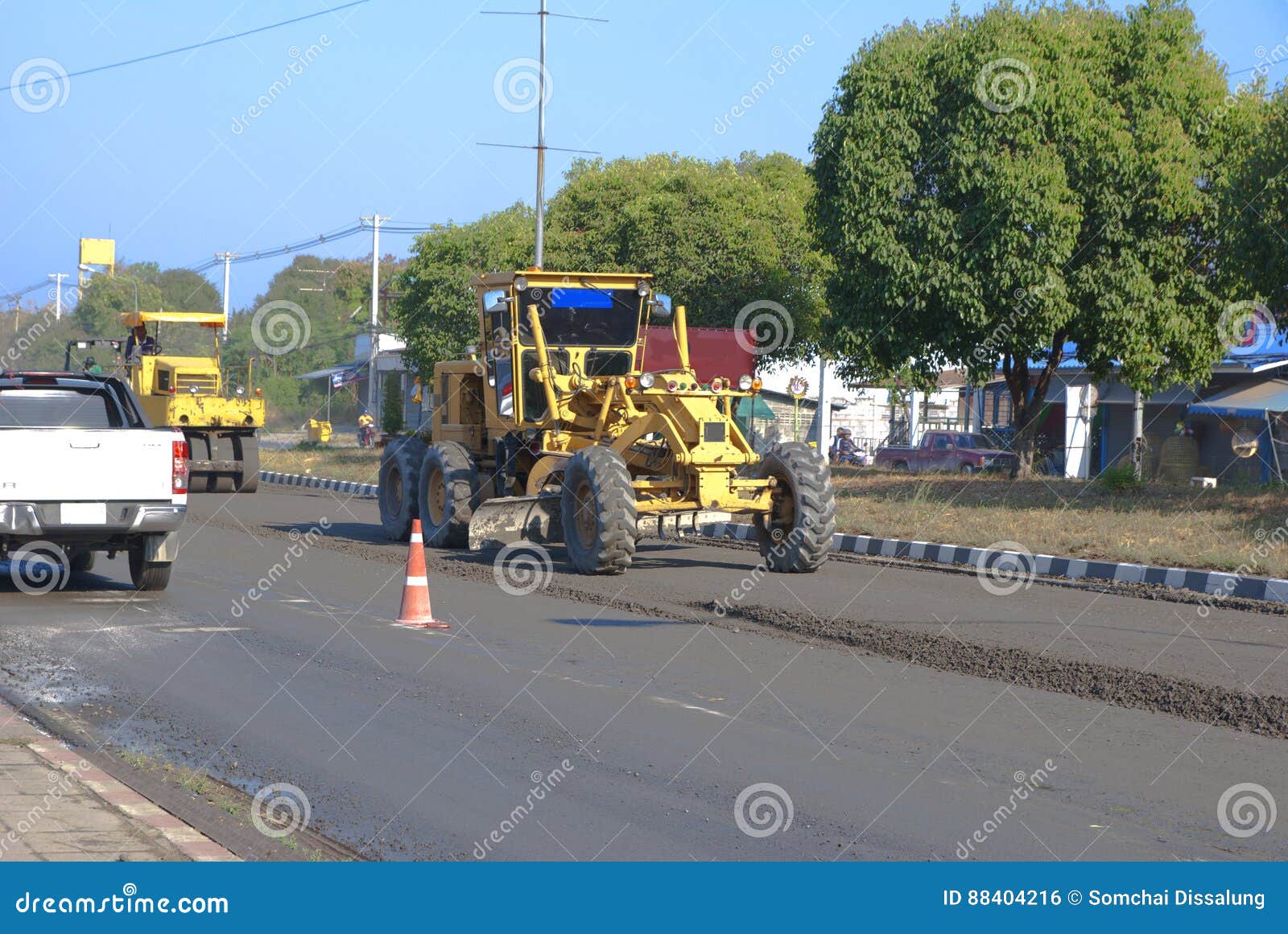 Motor grader is working stock photo. Image of outdoors - 88404216