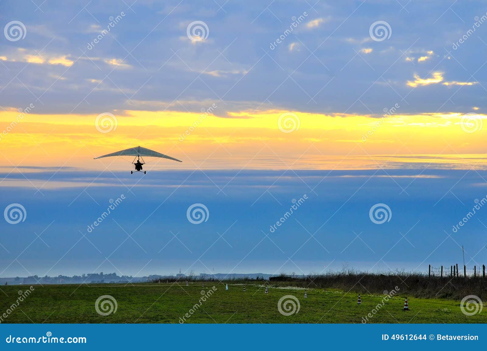 Motor Hang Glider in the Cloudy Sunset Stock Photo - Image of ...