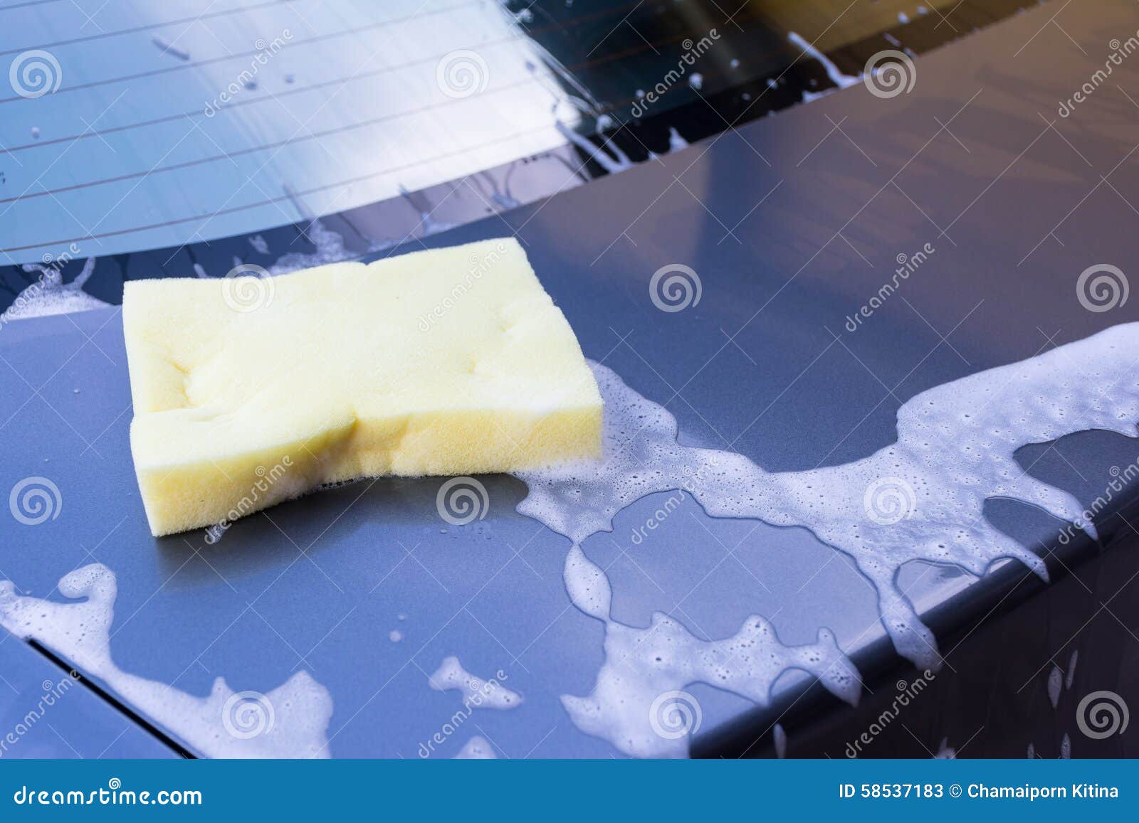 Motor Hood Being Cleaned with Sponge. Stock Image - Image of holding ...