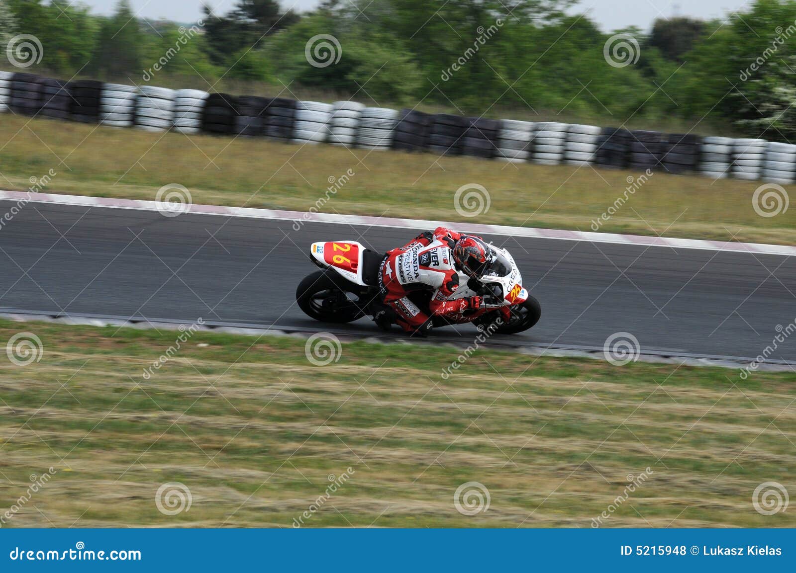 Motorbike Racing Driver Rides Into A Steep Climb Stock Photography ...