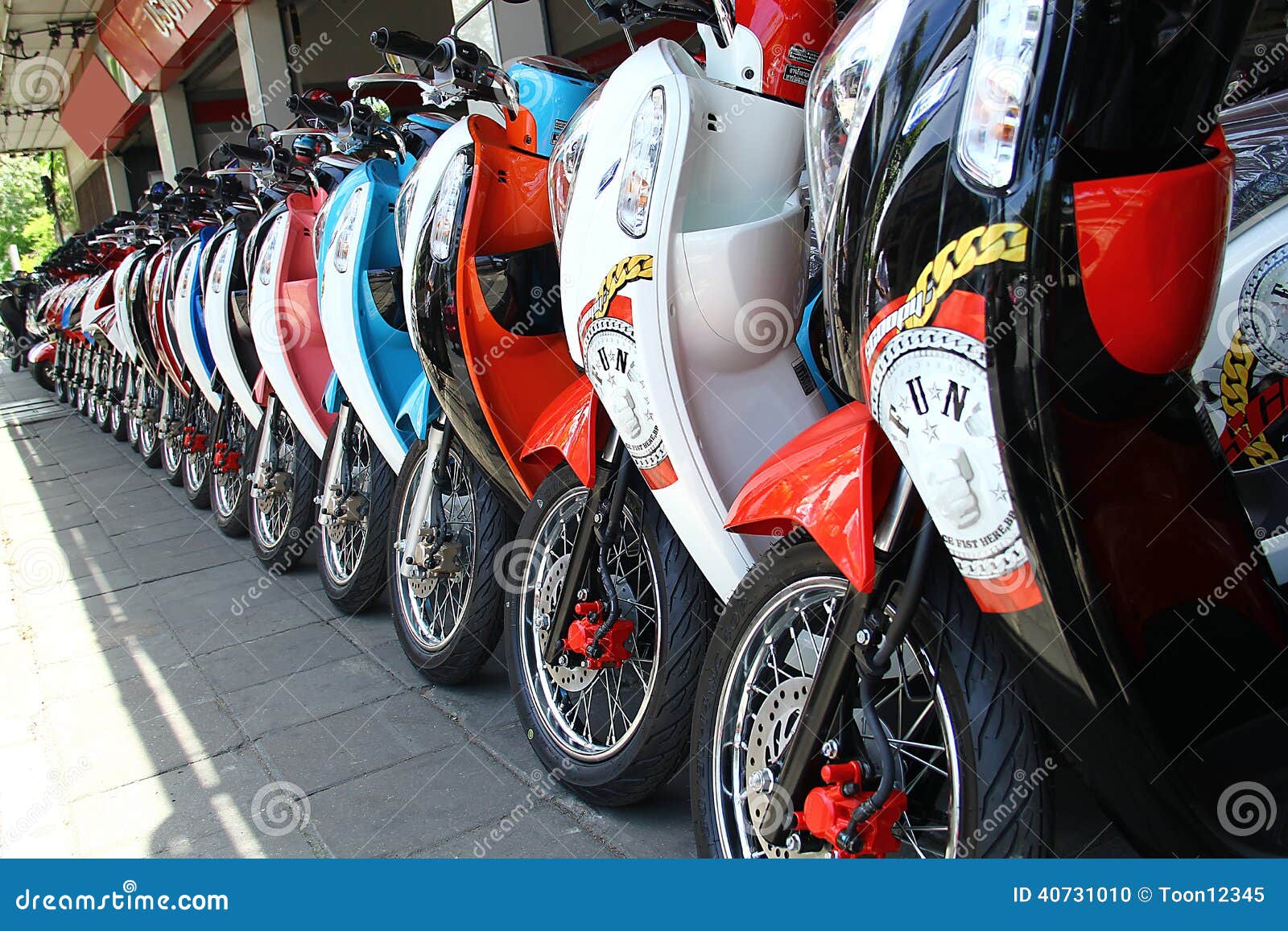 Motorbikes in a Row with Perspective Stock Photo - Image of scooter ...