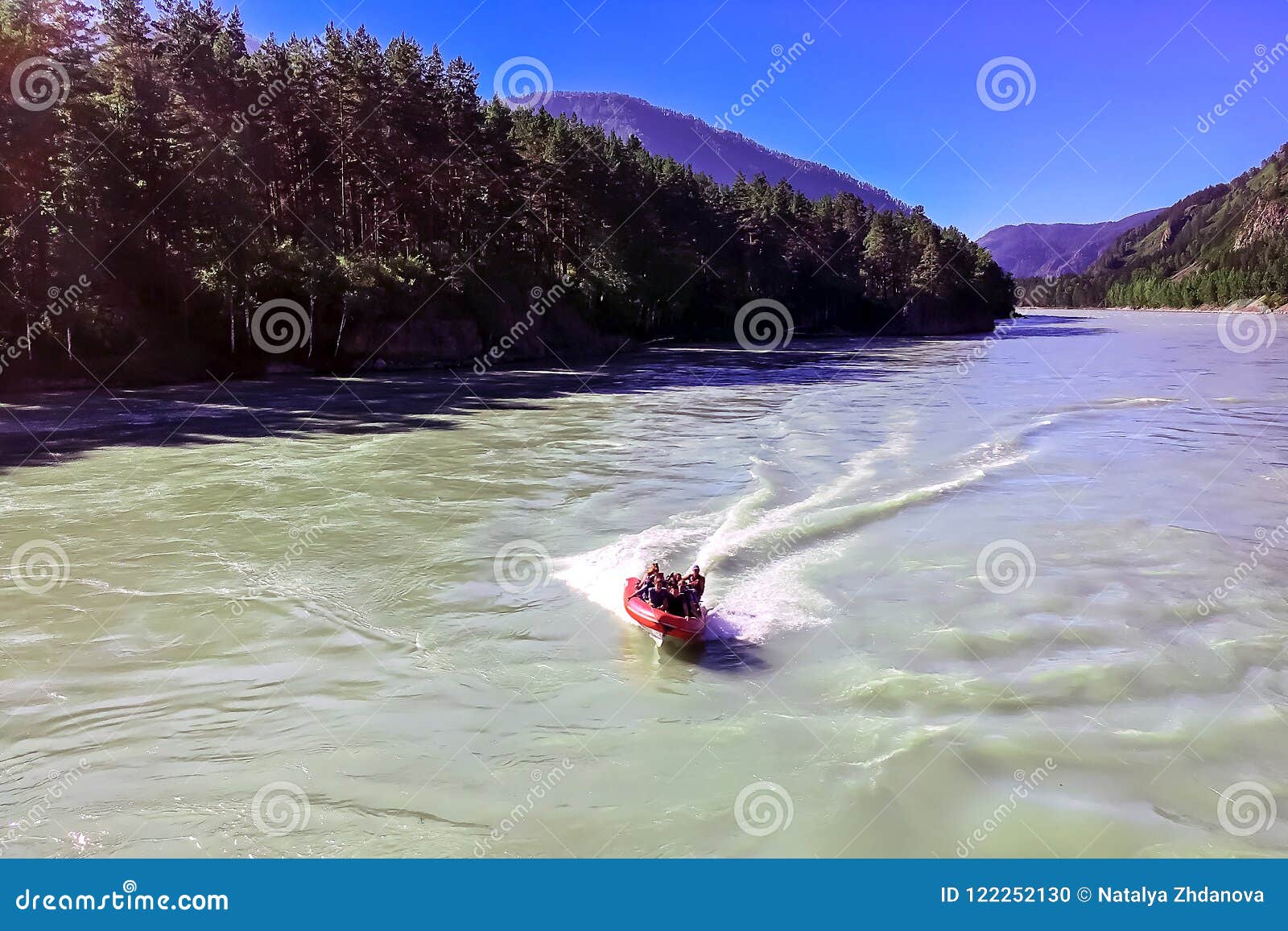 Motorboat with people stock photo. Image of passenger - 122252130