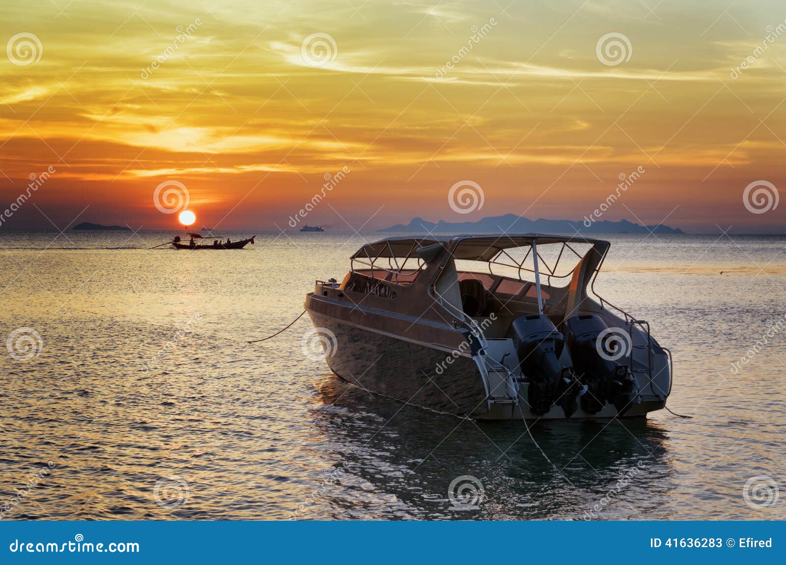 Motorboat at sunset stock image. Image of blue, nautical - 41636283