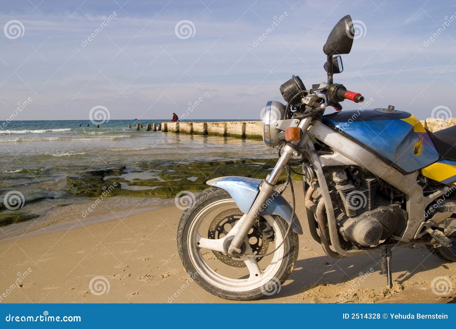 Motorcycle at the beach stock photo. Image of blue, pier - 2514328