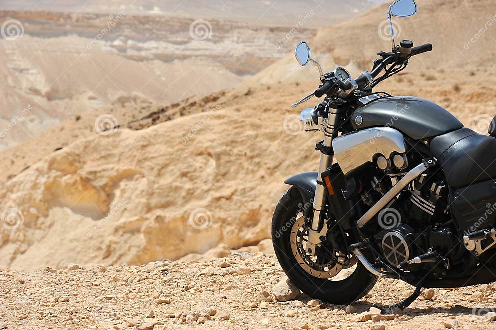 Motorcycle in a desert stock image. Image of journey - 25032903