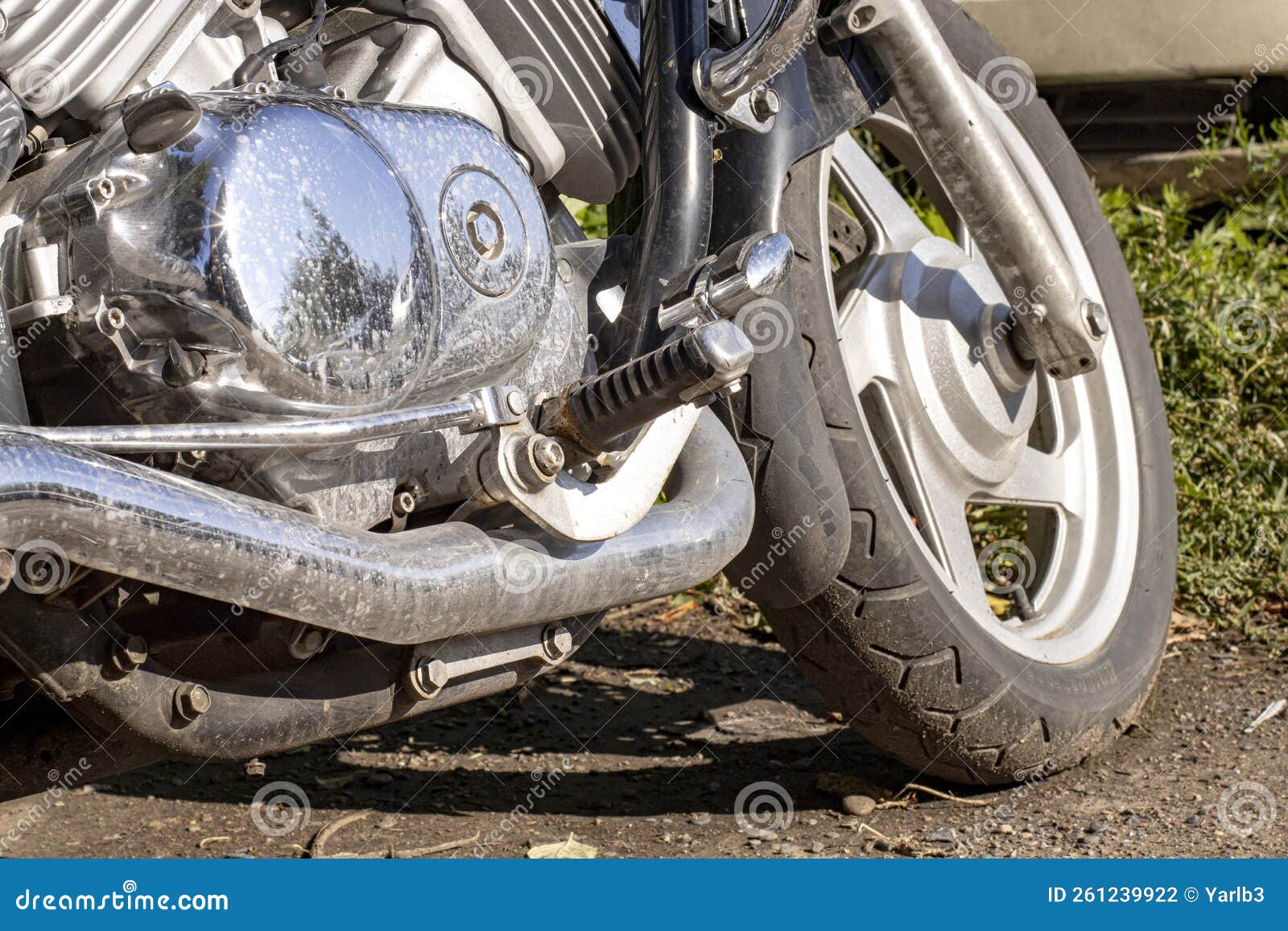 Motorcycle on a Dirt Road, Engine Parts and Front Wheel Stock Photo ...