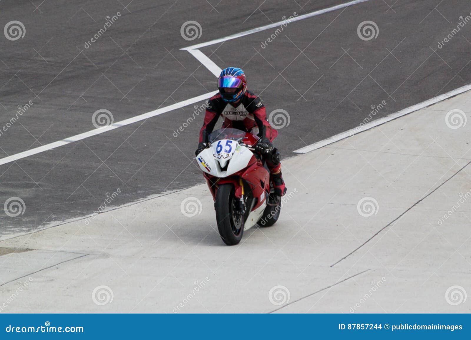 Motorcycle Driver Pulling To The Paddocks Picture. Image: 87857244