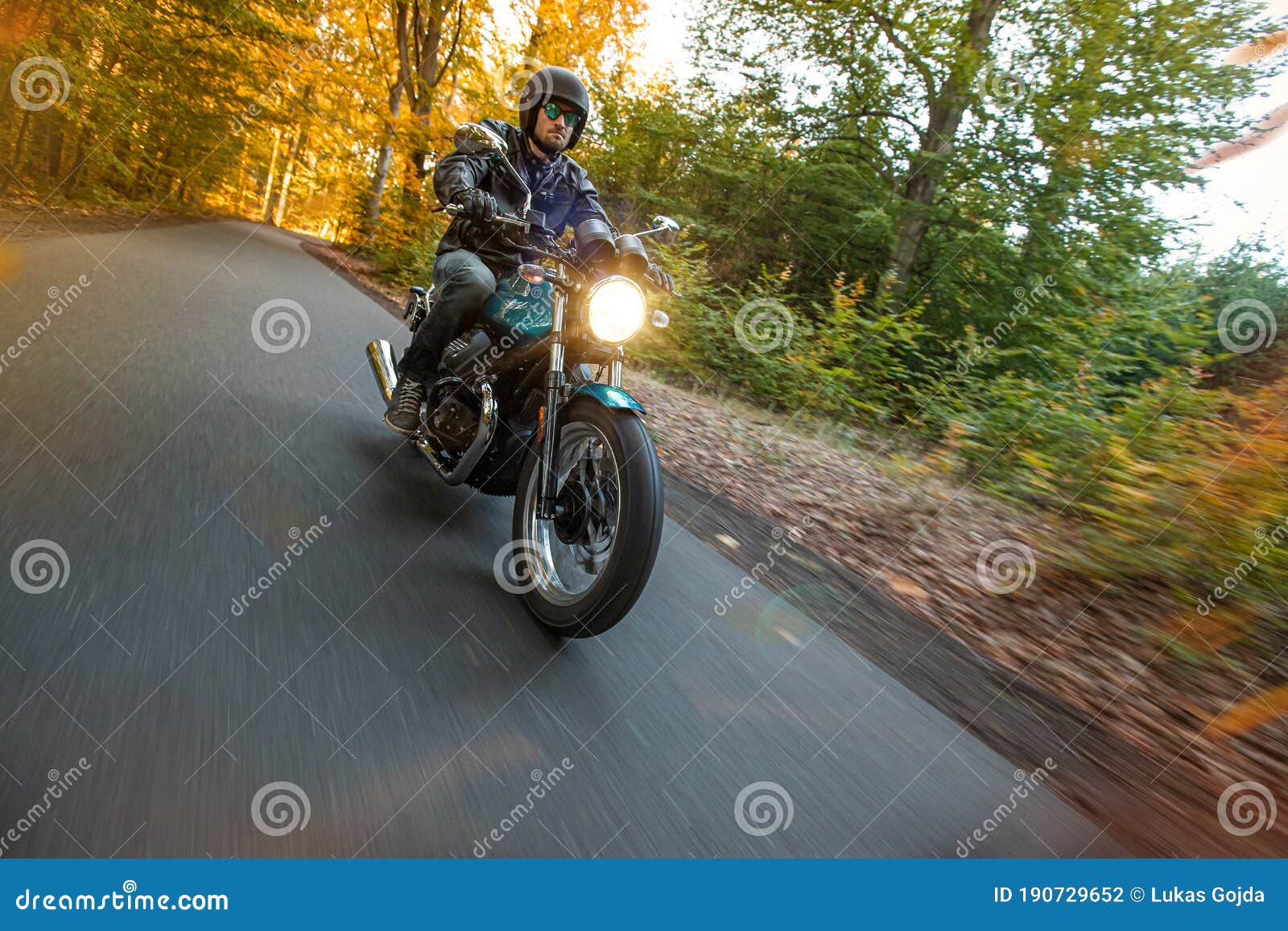 Motorcycle Driver Riding in Autumn Forest Stock Photo - Image of ...
