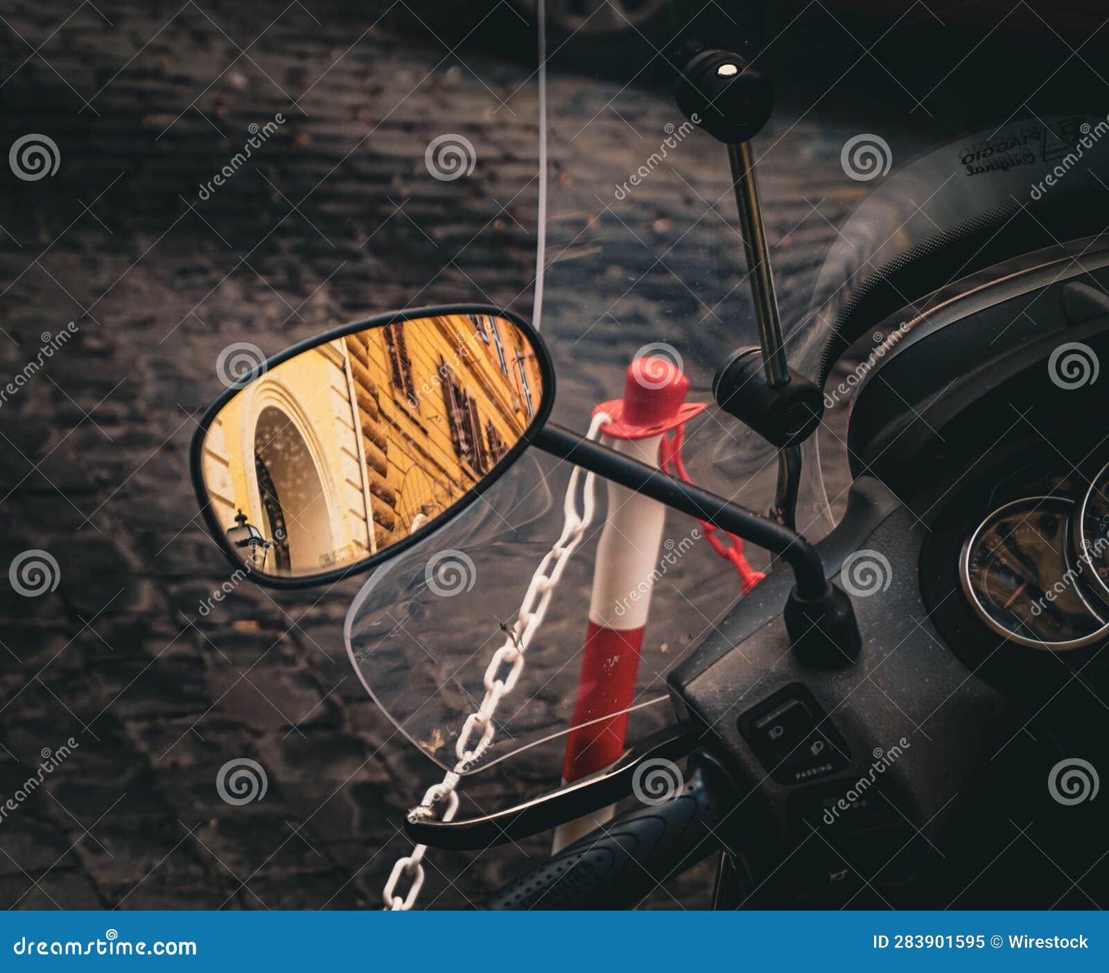 A Motorcycle with Its Mirror Down and Reflection in it S Side Stock ...