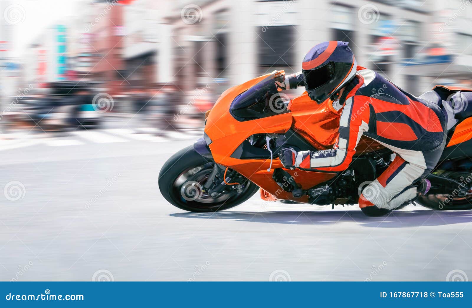 Motorcycle Leaning into a Fast Corner in Downtown Stock Photo - Image ...