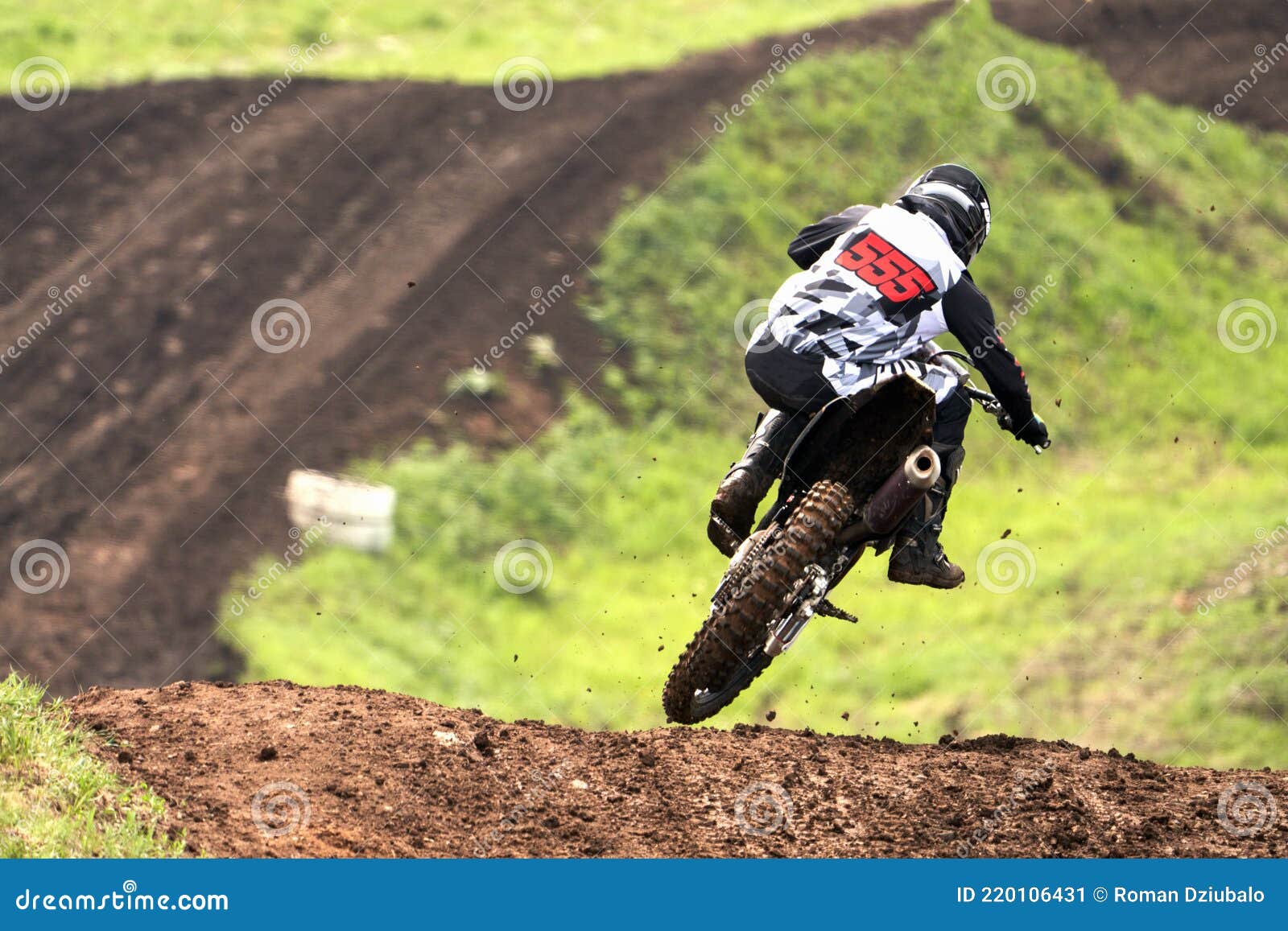 A Motorcycle Racer Loses His Balance in a Jump from an Obstacle ...