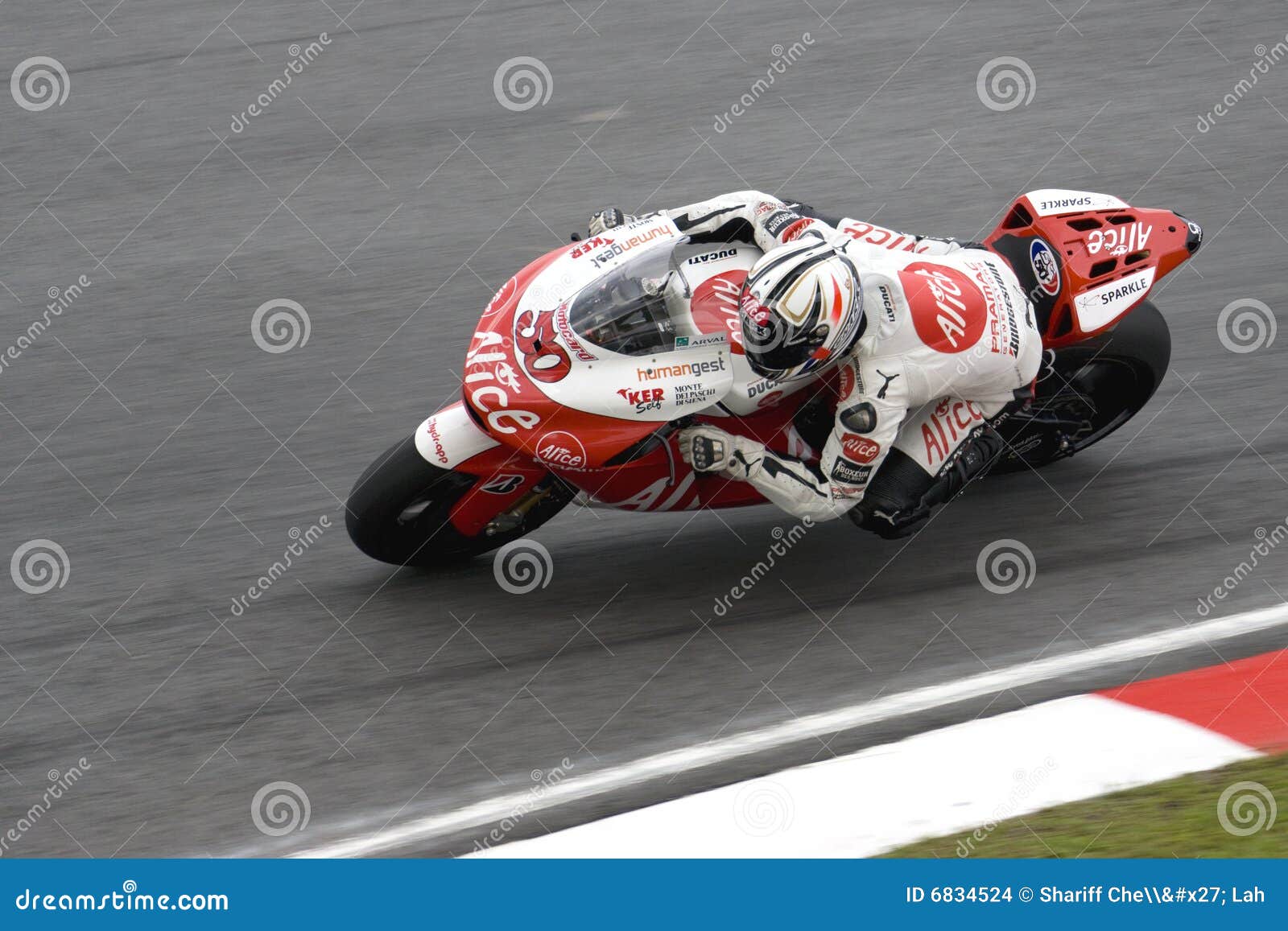 Motorcycle racer on track editorial stock image. Image of sepang - 6834524