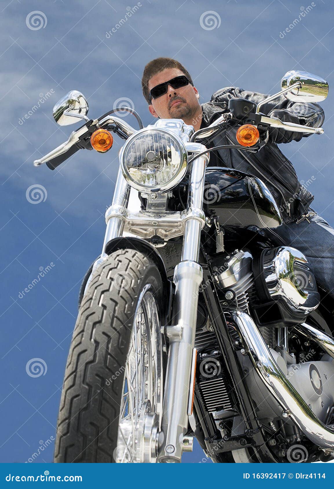 A Motorcycle Rider Who Forcefully Intervenes Between Two Cars. Concept ...