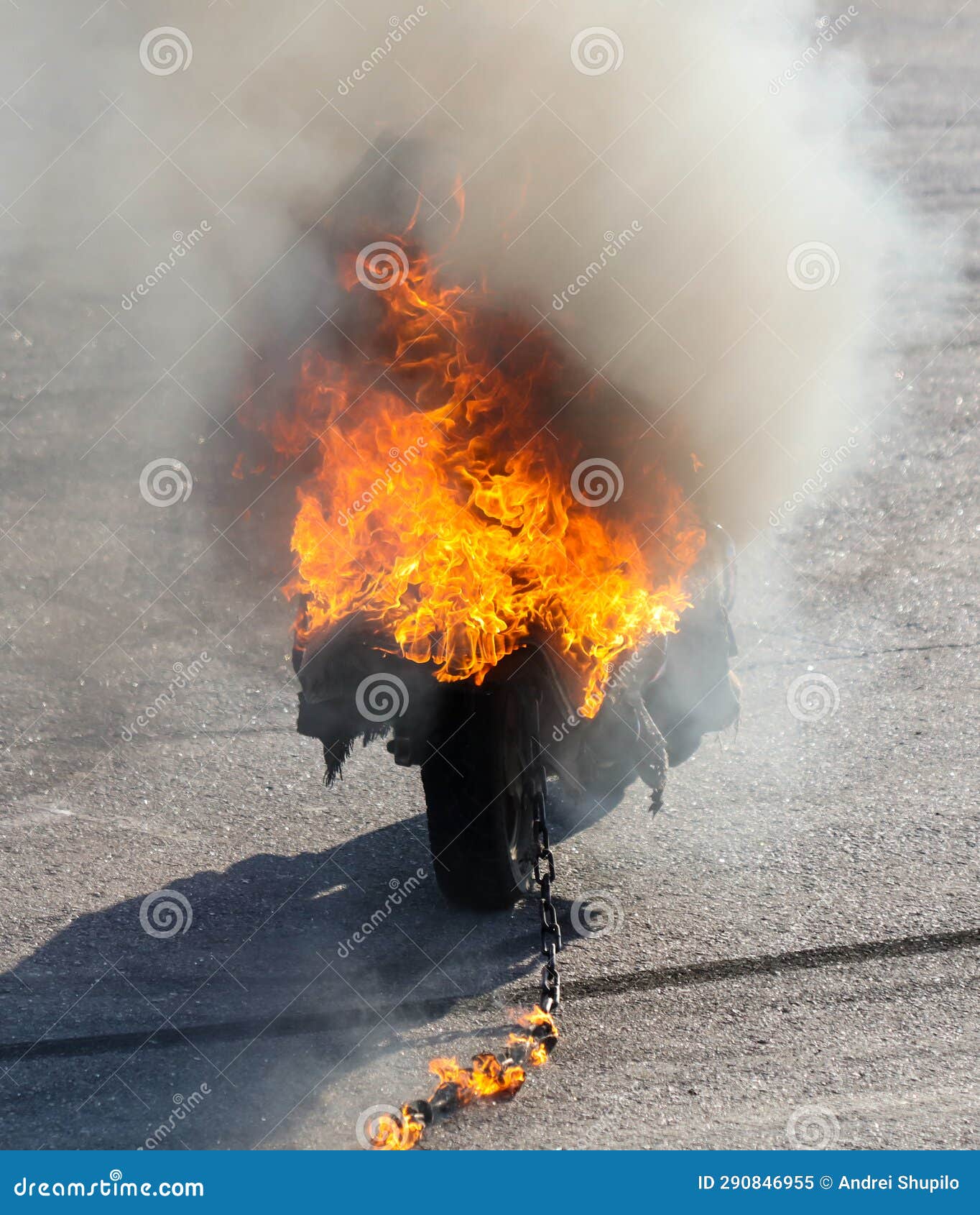 The Motorcycle Rides in Flames of Fire on the Road Stock Image - Image ...