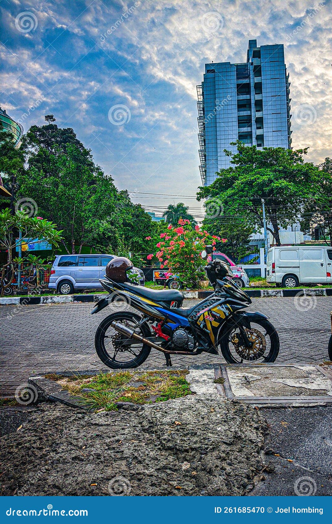 Motorcycle with a Tower and Little Bit Tree Editorial Image - Image of ...