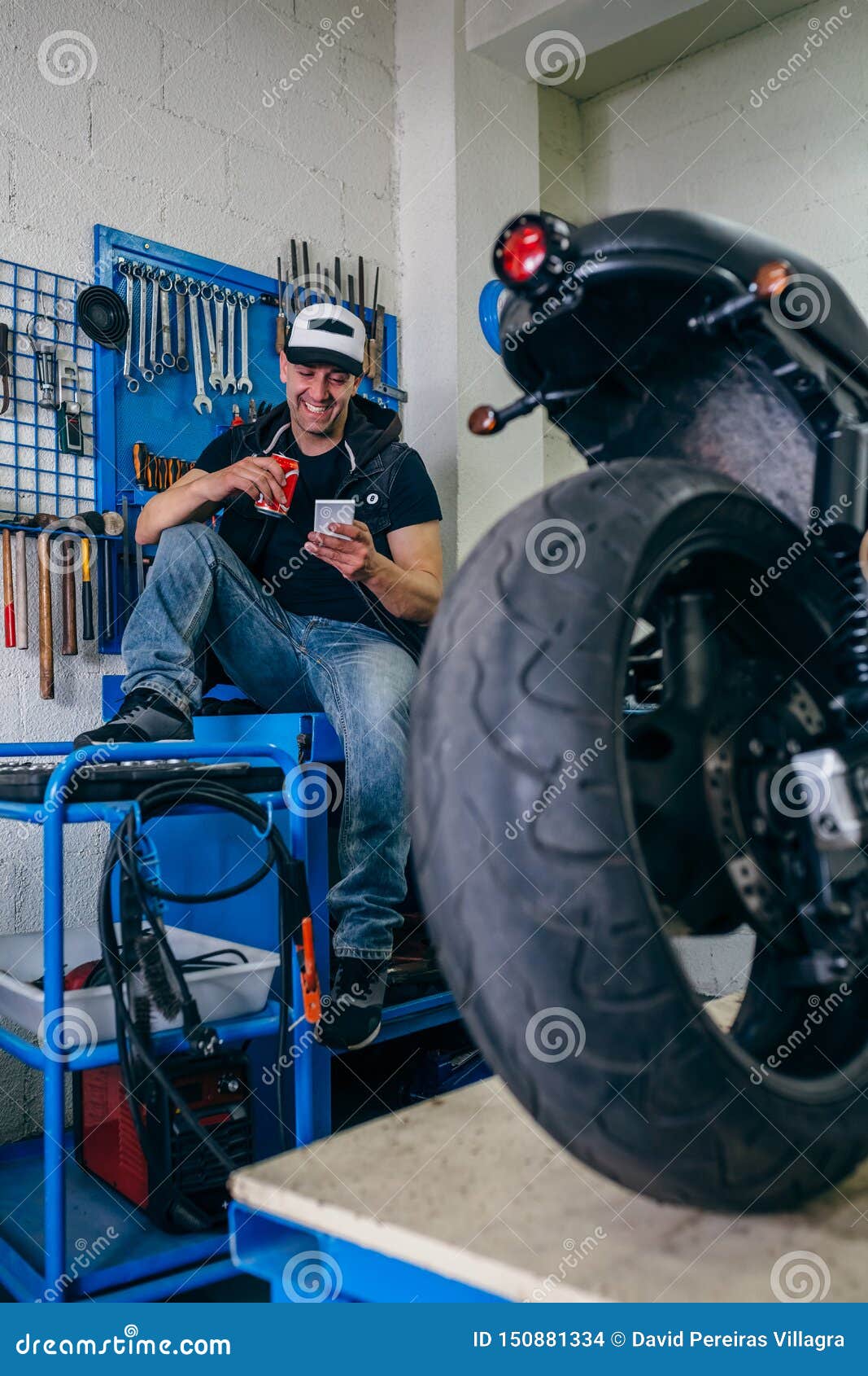 Motorcycles Mechanic Resting Having a Beer Stock Photo - Image of ...