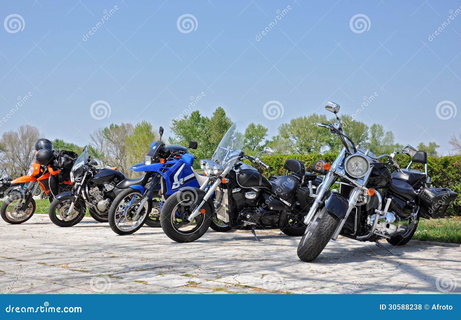 Motorcycles in row editorial stock photo. Image of adventure - 30588238