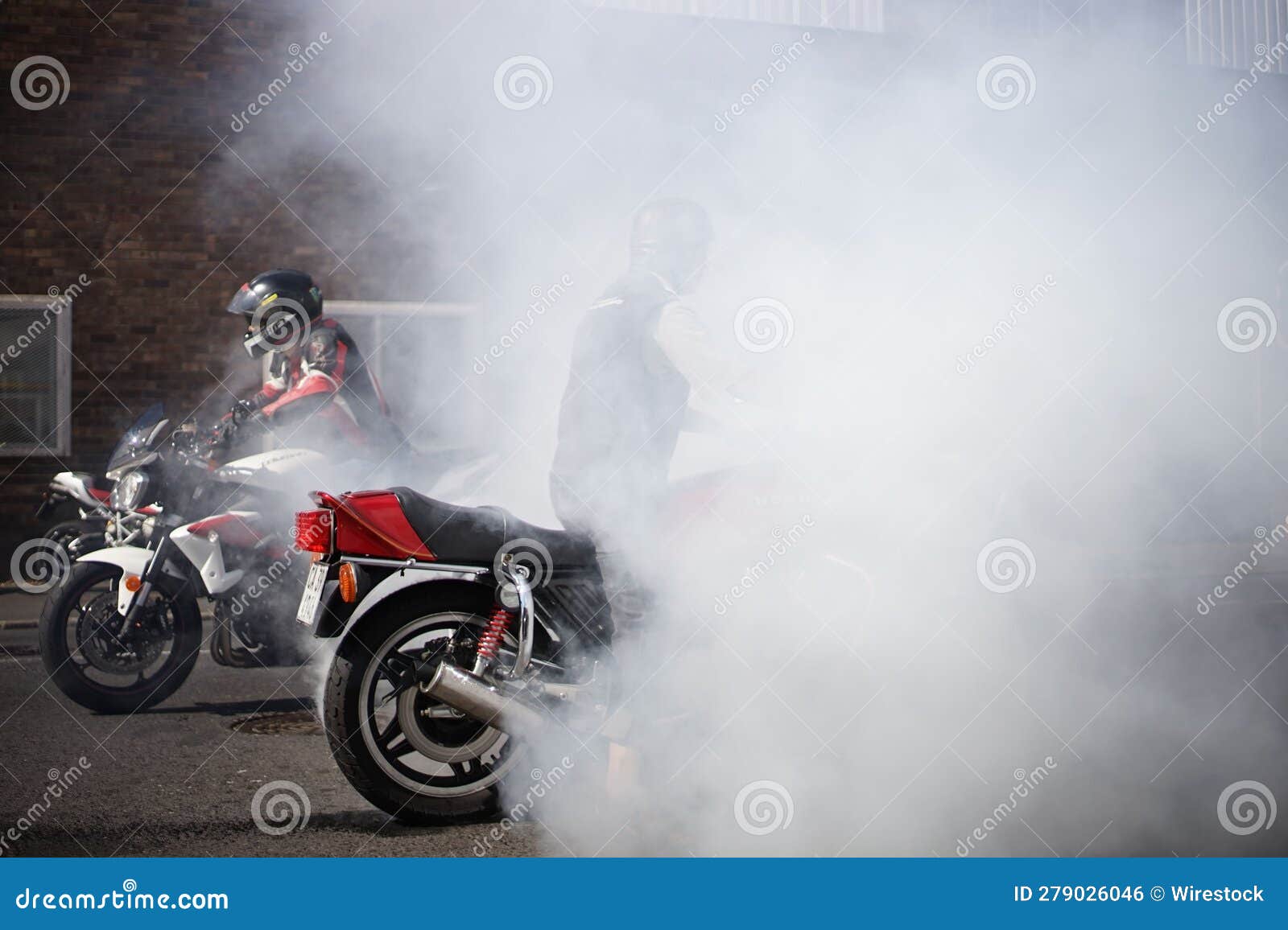 Motorcycles on the Street Raising a Cloud of Smoke. Editorial Photo ...
