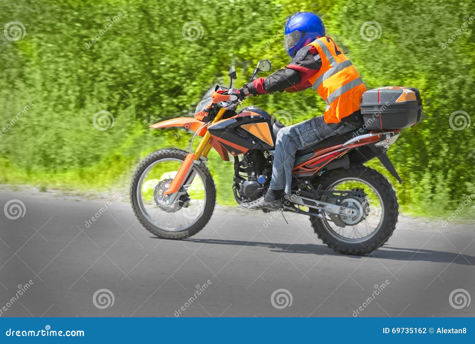 Motorcyclist Biker Fast Riding Stock Photo - Image of riding, looking ...