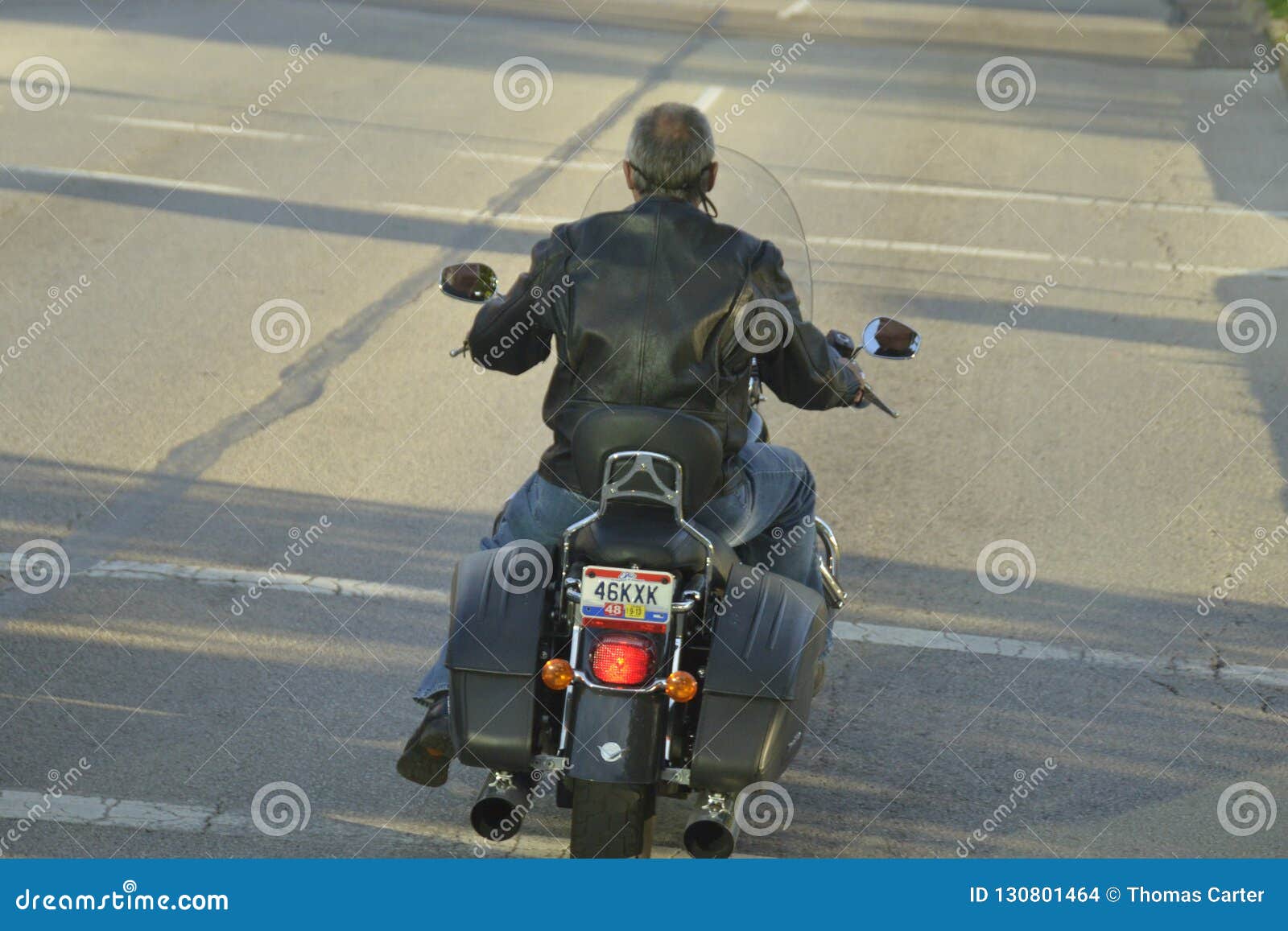 Motorcyclist Riding Down the Street Editorial Stock Image - Image of ...