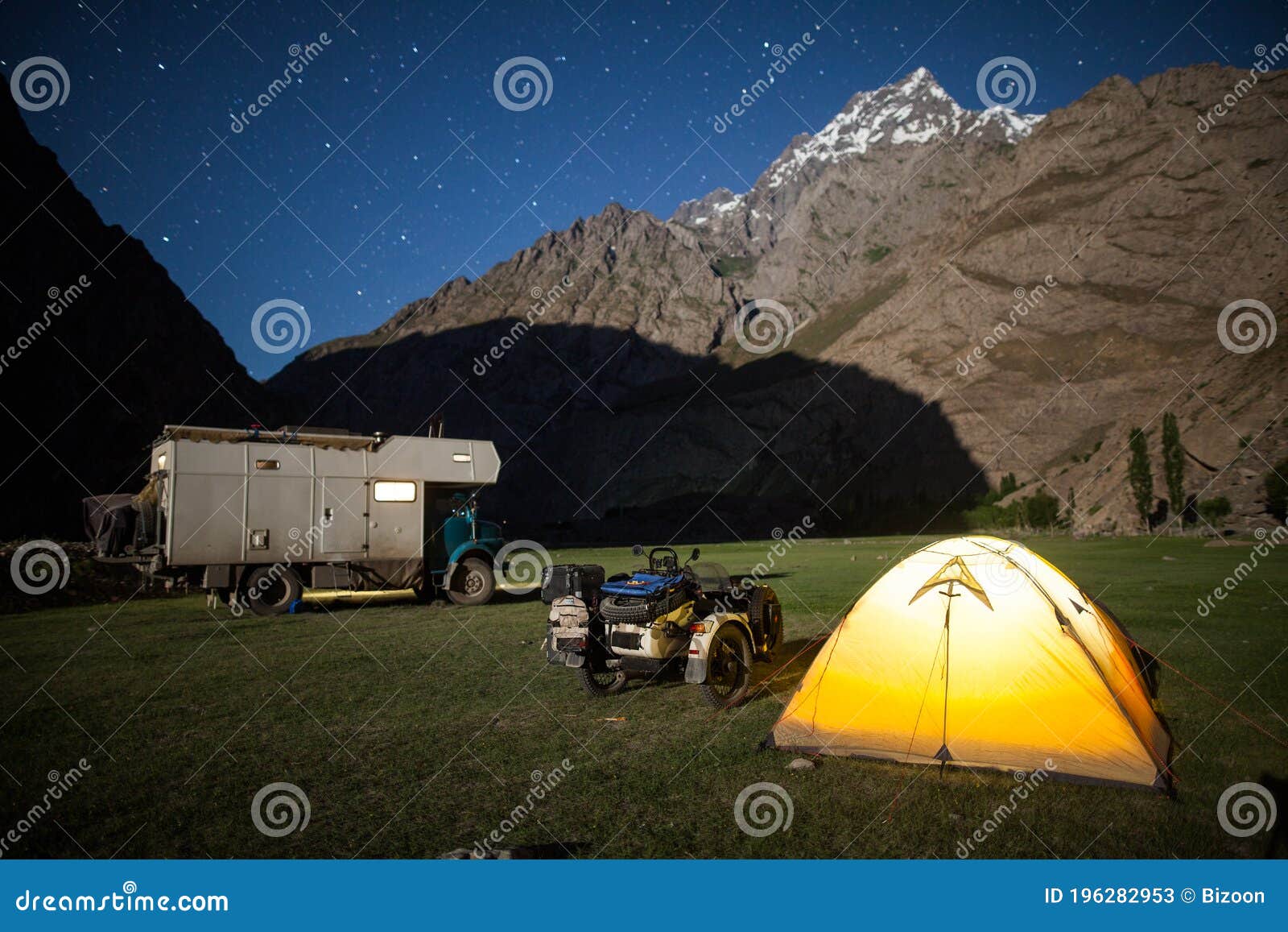 Motorhome, Sidecar Motorcycle and Tent, Camping in the Mountains Stock ...