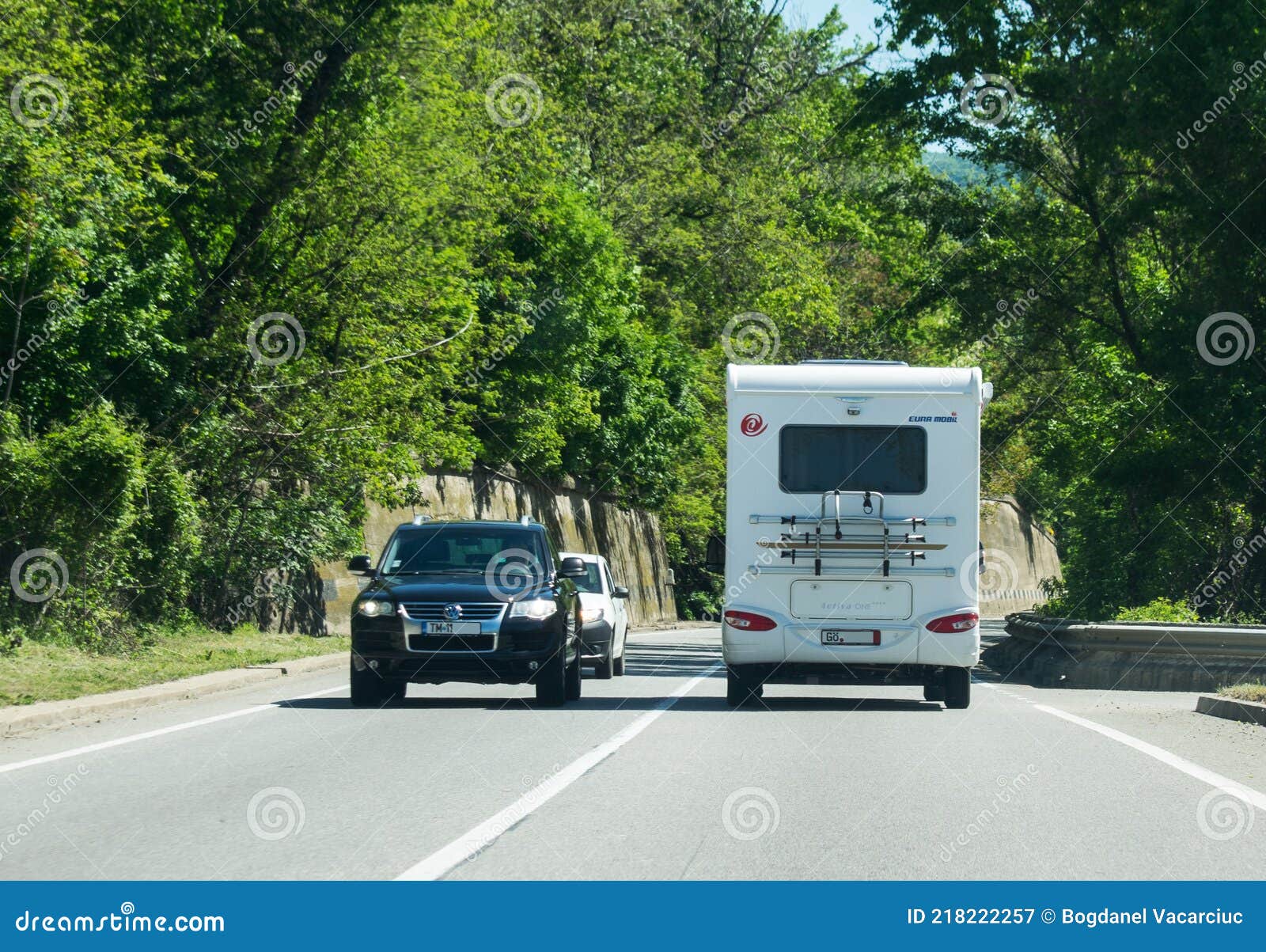 Motorhome in Traffic. Pass Other Vehicles on the Highway Editorial ...