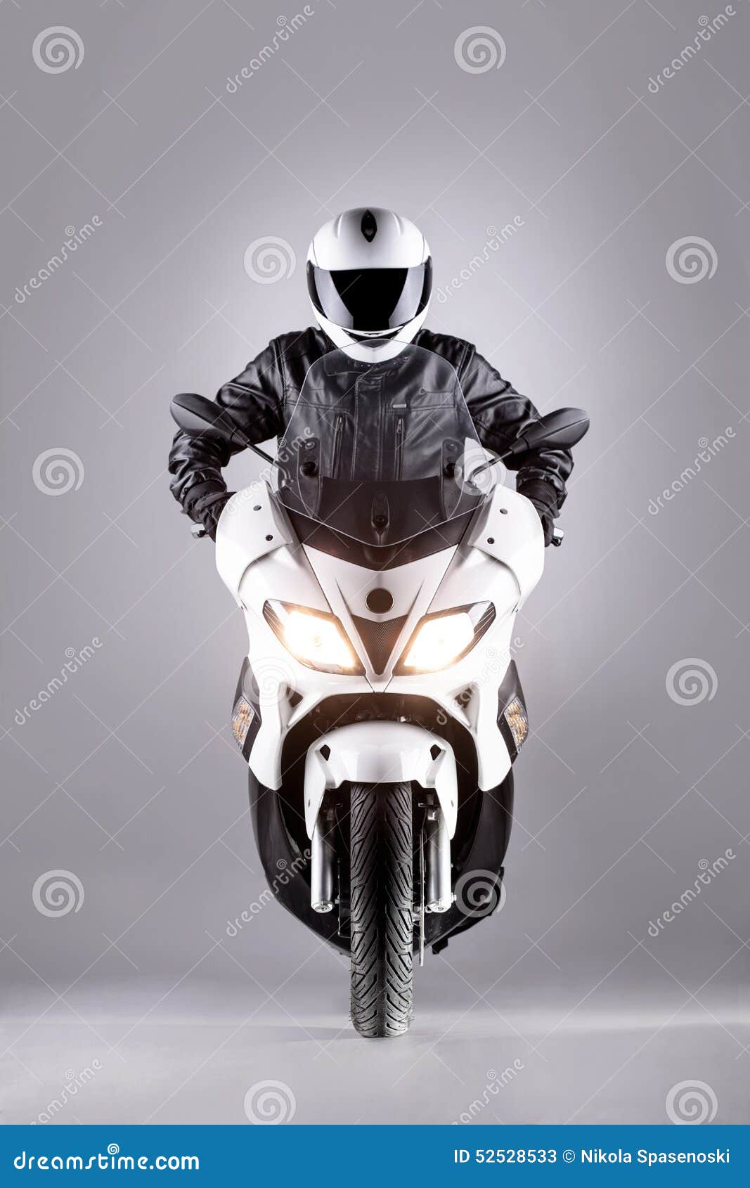 Motorist on a motorcycle stock image. Image of minibike - 52528533