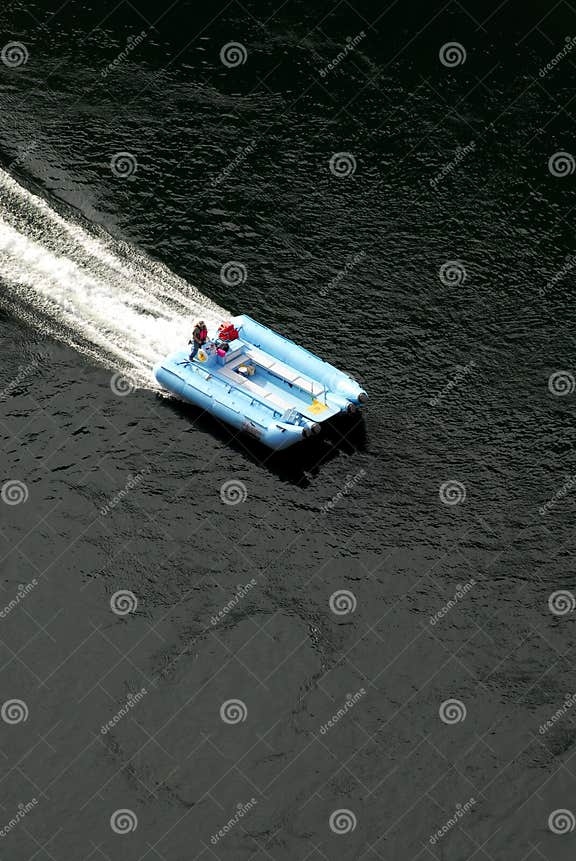 Motorized blue raft stock image. Image of speed, recreation - 10878607