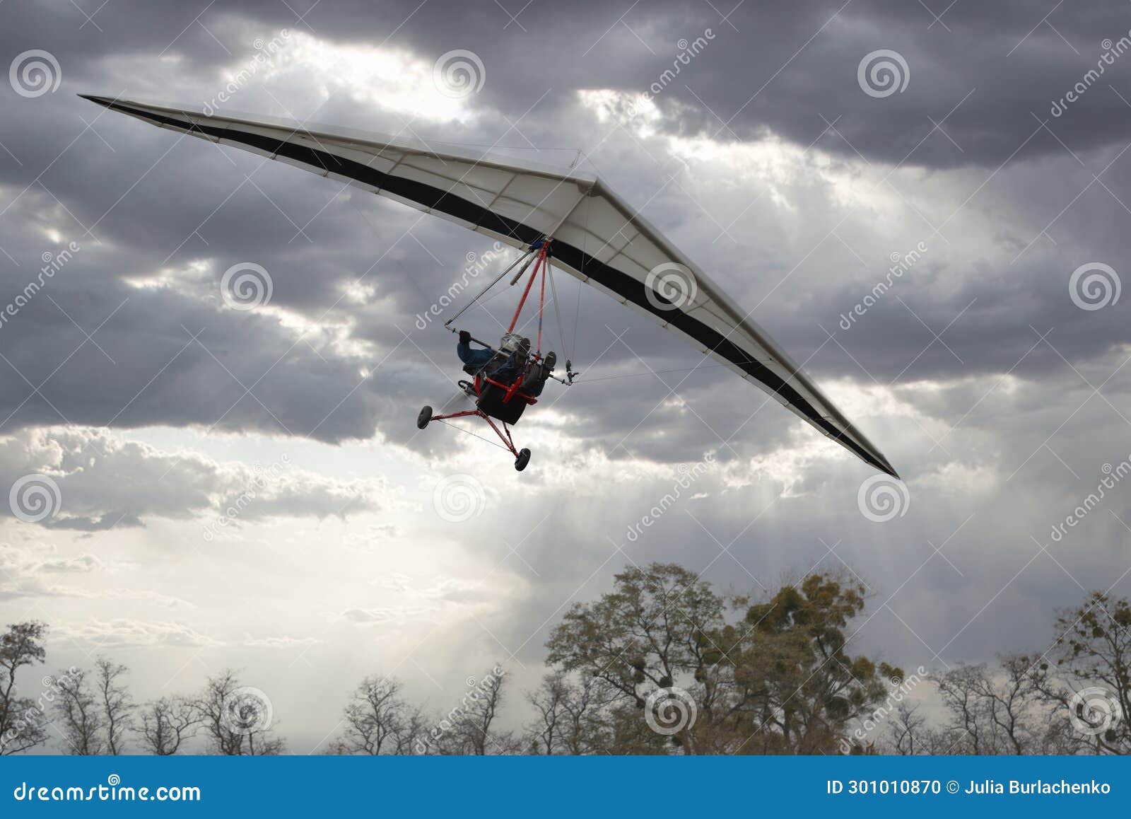 Motorized Hang Glider Trike Wing in Flight Stock Photo - Image of ...