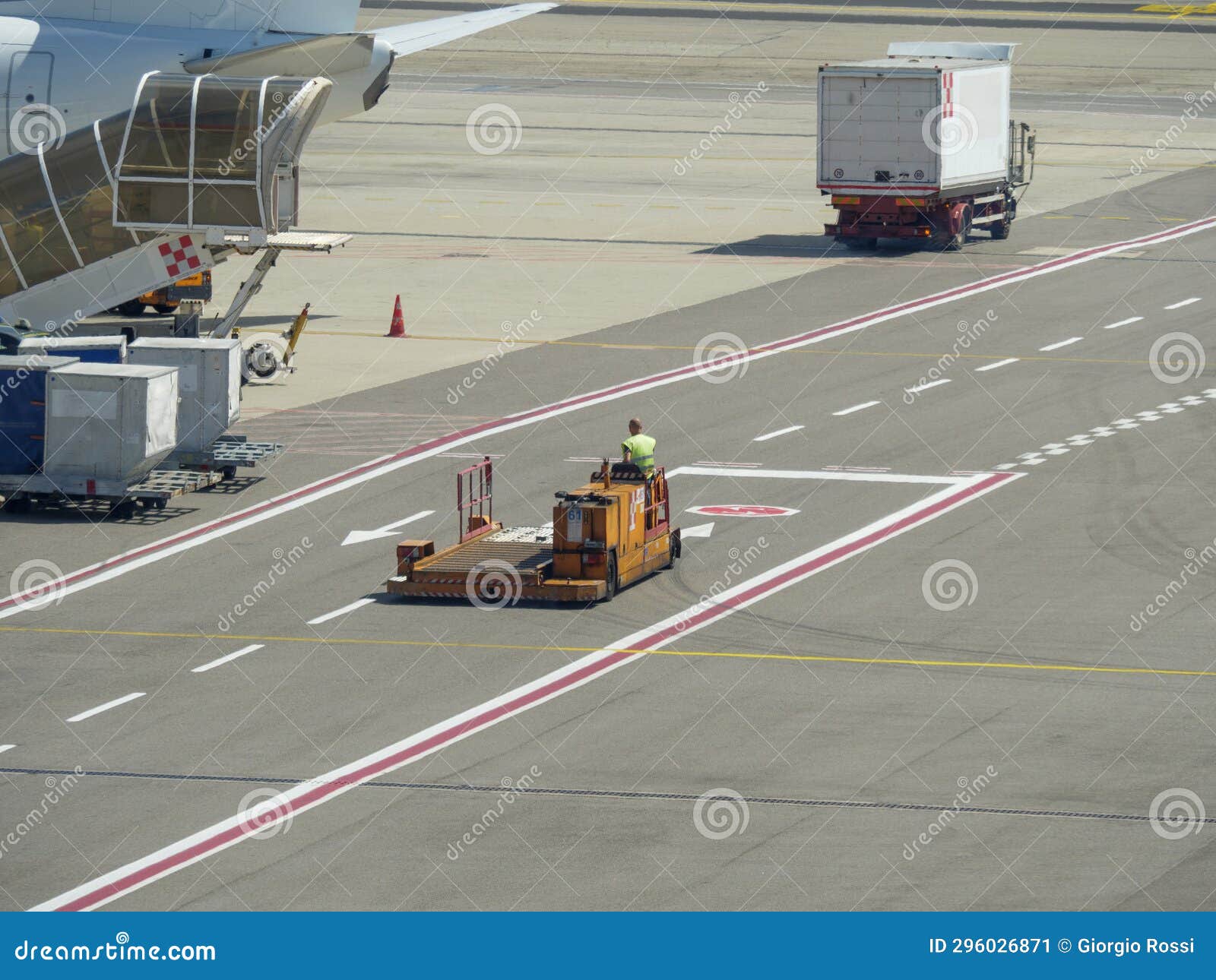 Motorized Moving Platform Transported by an Operator Near an Airport ...
