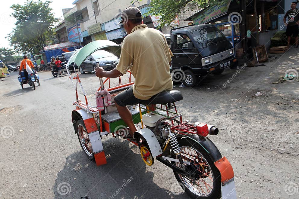 Motorized ricksaw editorial stock photo. Image of wheel - 54637393